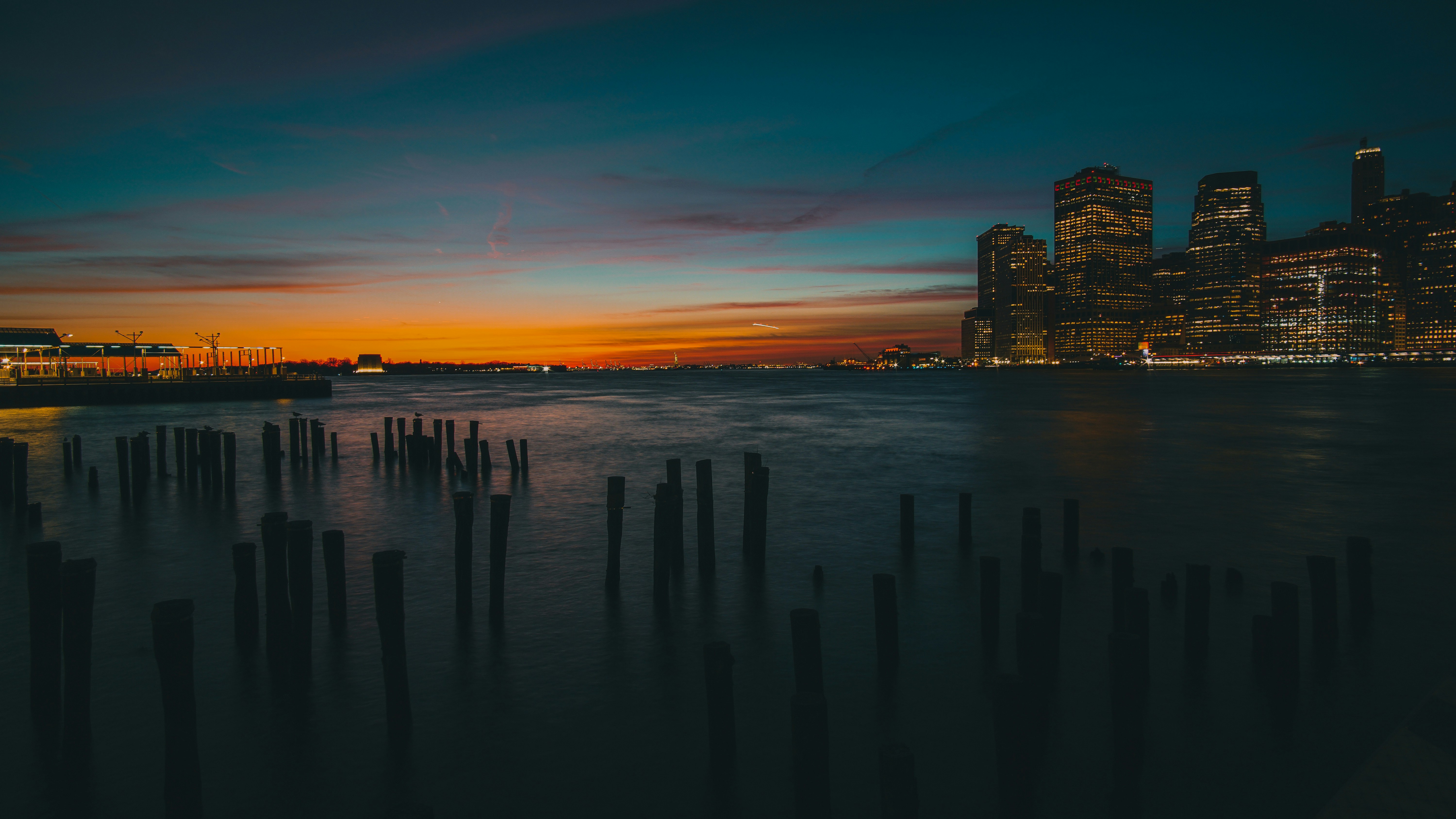 Twilight Skyline Over Weathered Piers