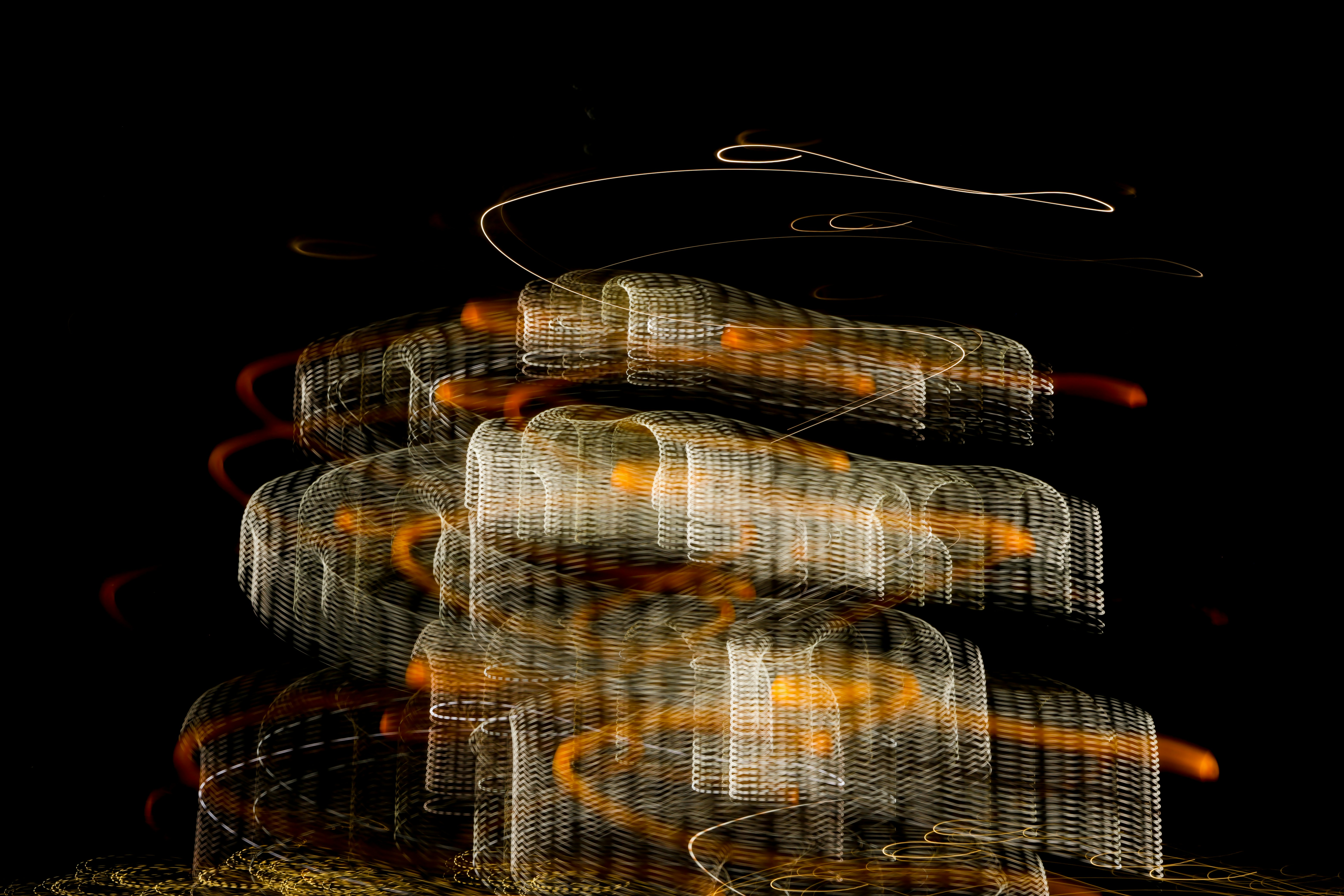 Spiraled Light Sculptures: A Night of Moving Orbits