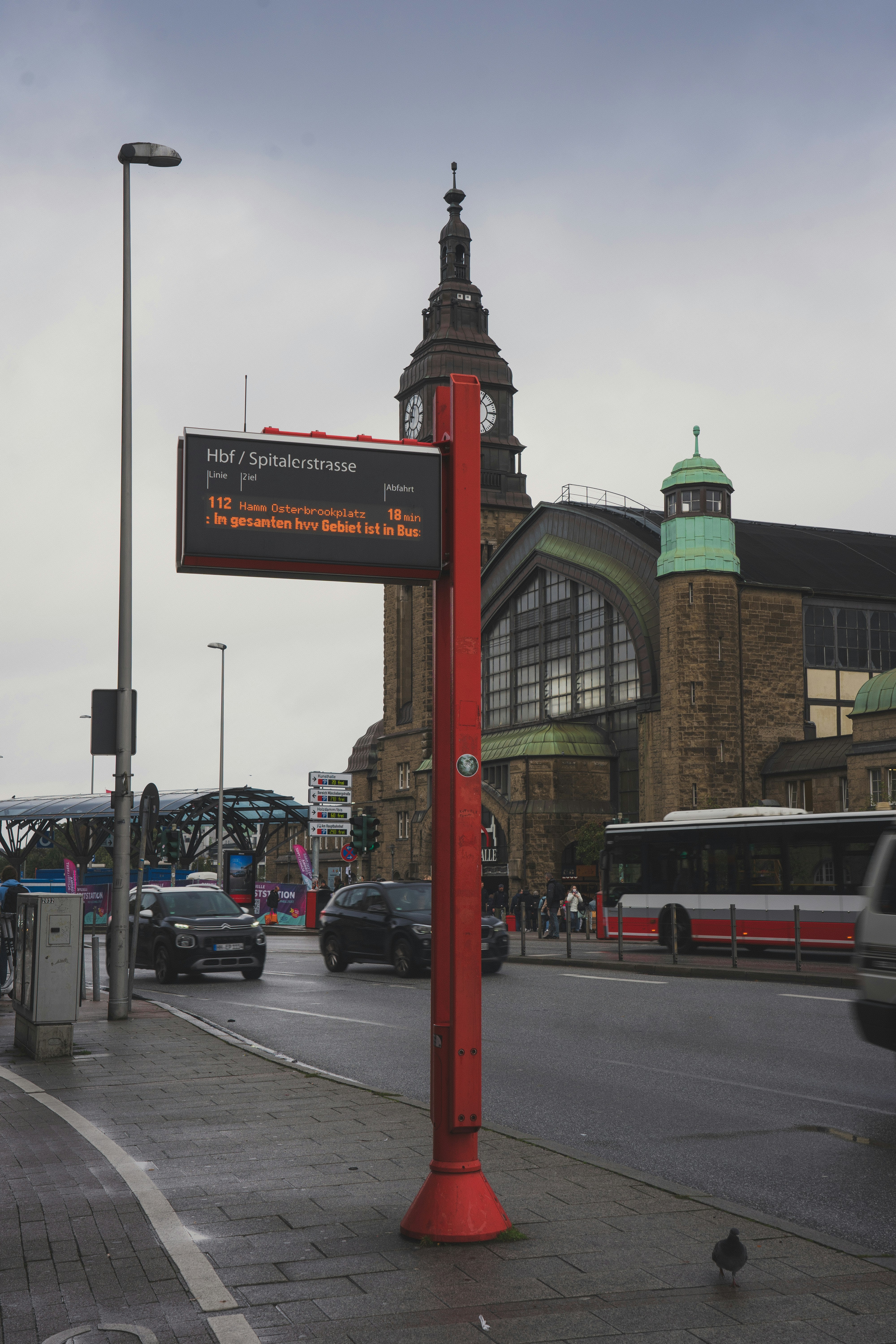 A red pole on the side of a road photo – Free Hamburg Image on Unsplash