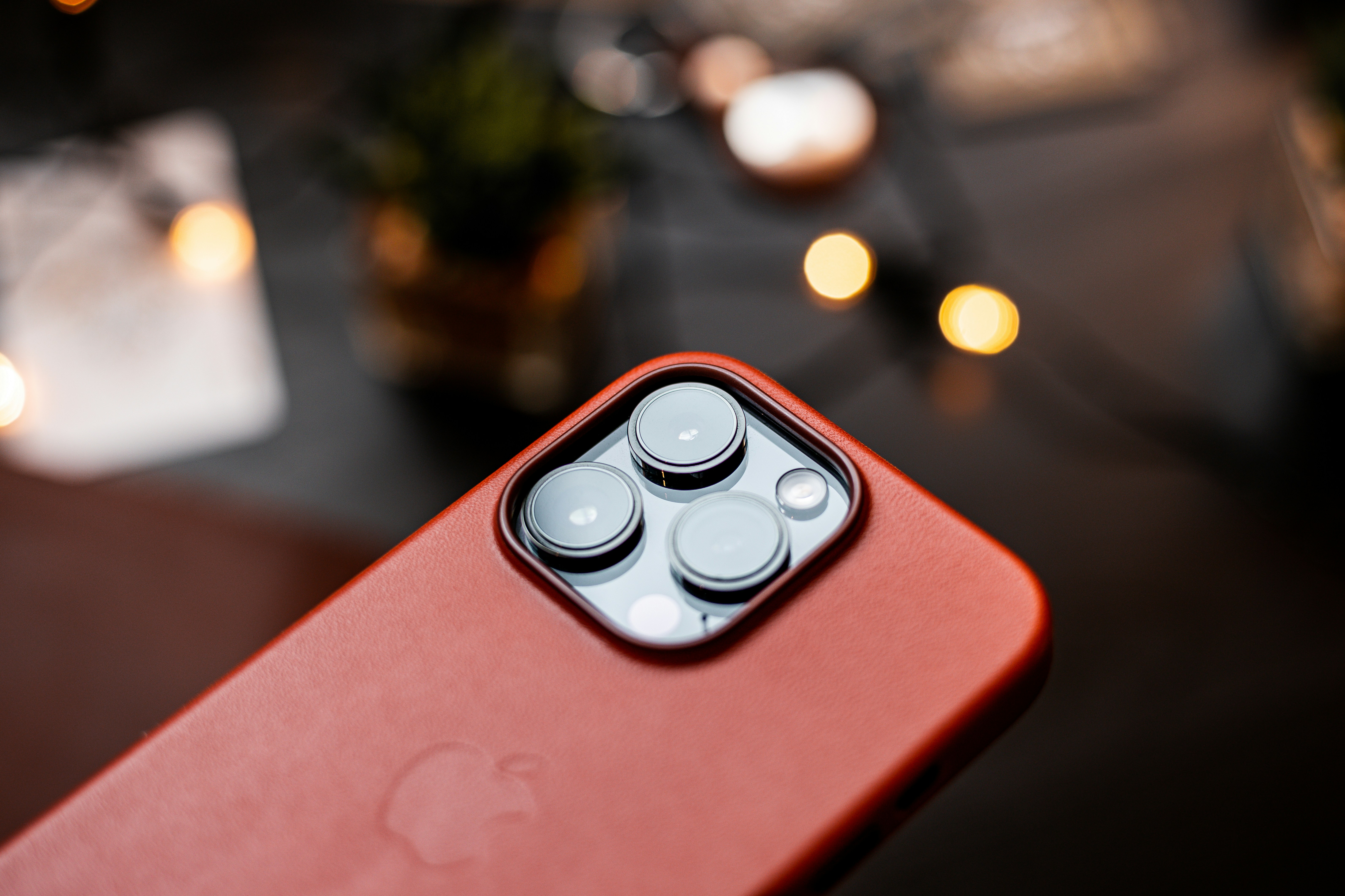 A close up of a red cell phone case photo – Free Brown leather Image on ...