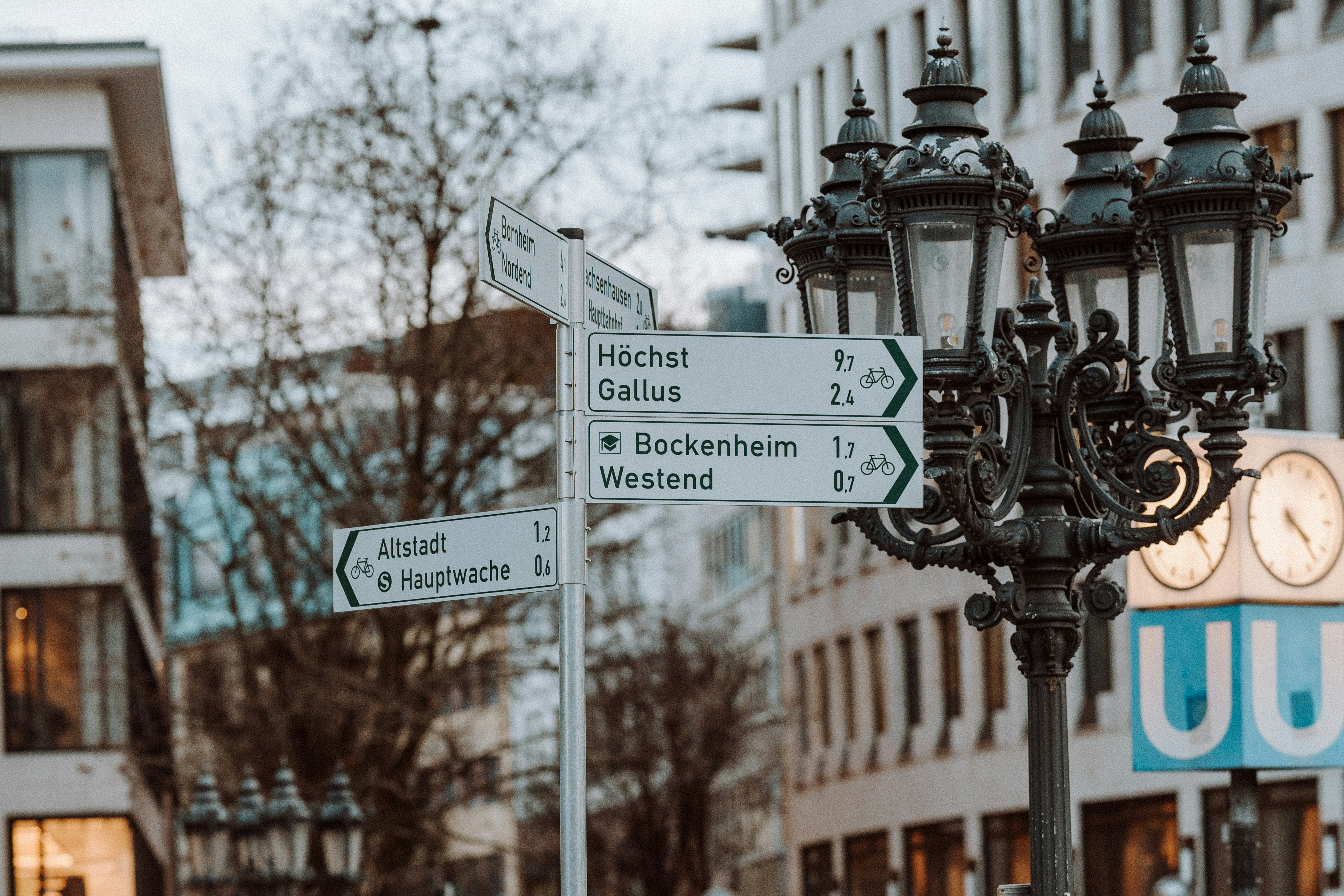 A street light with street signs on it photo – Free Symbol Image on ...
