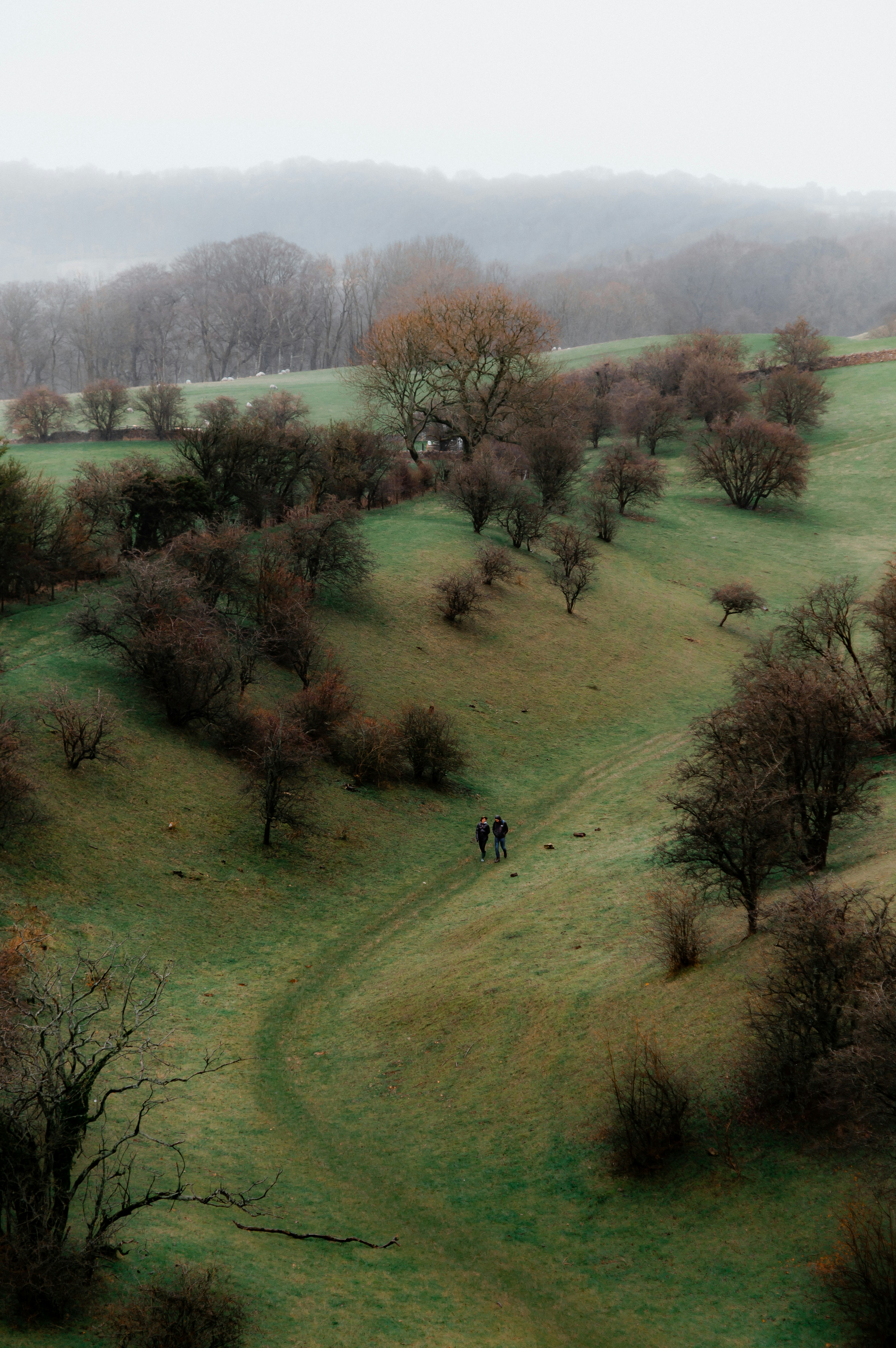 People walking along the vicinity of Broadway Tower