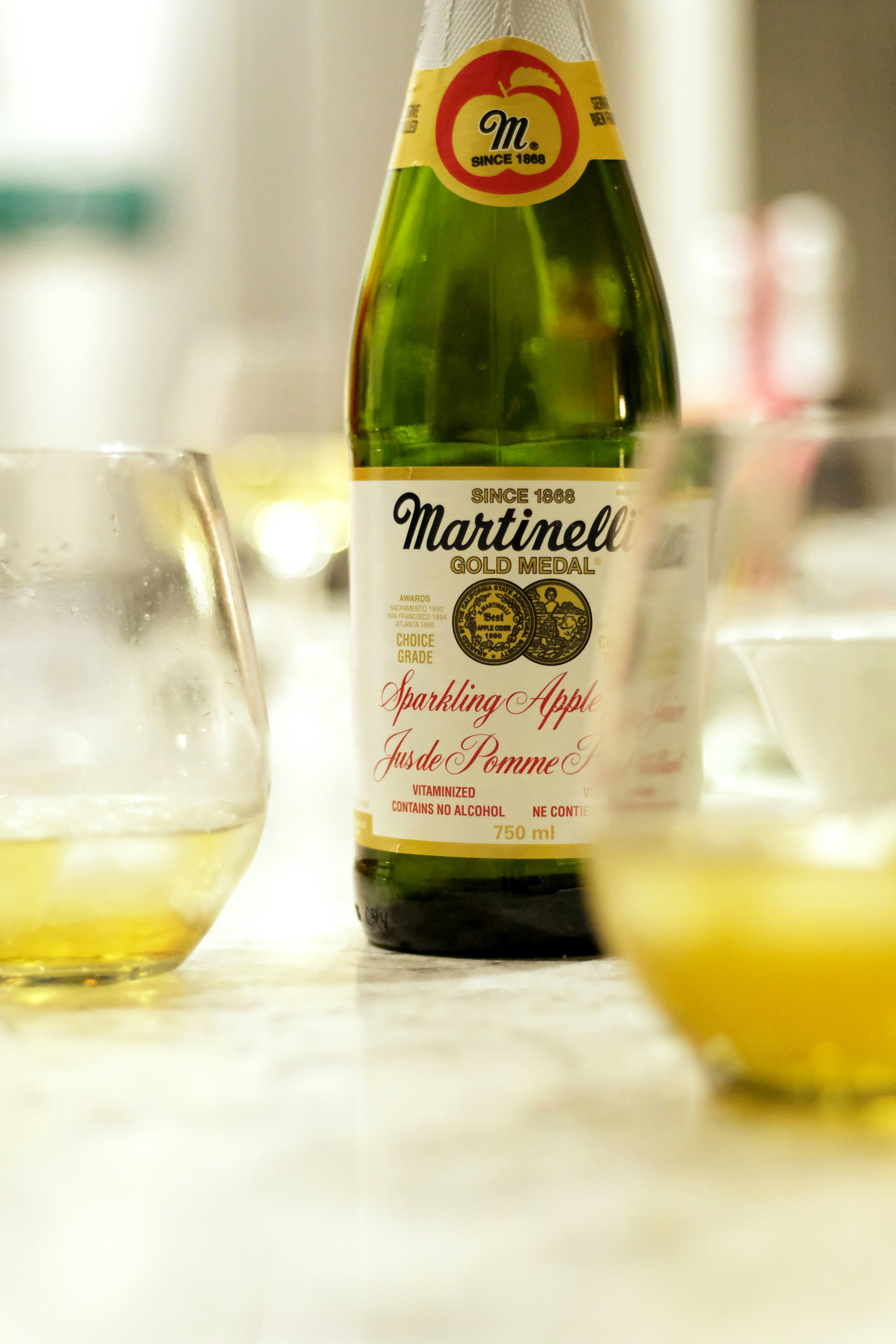 a bottle of wine sitting on top of a table