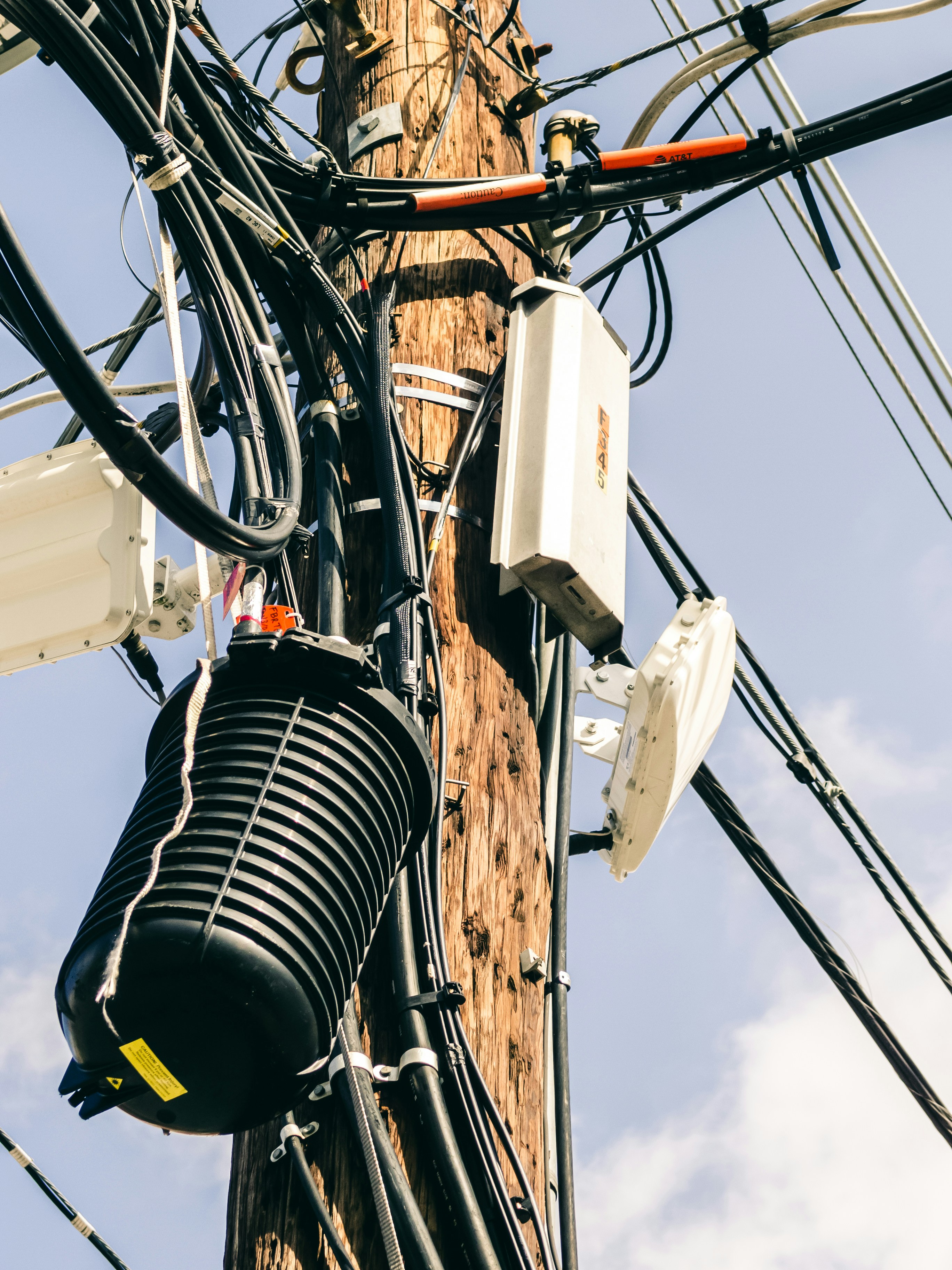 A telephone pole with multiple electrical wires attached to it photo ...