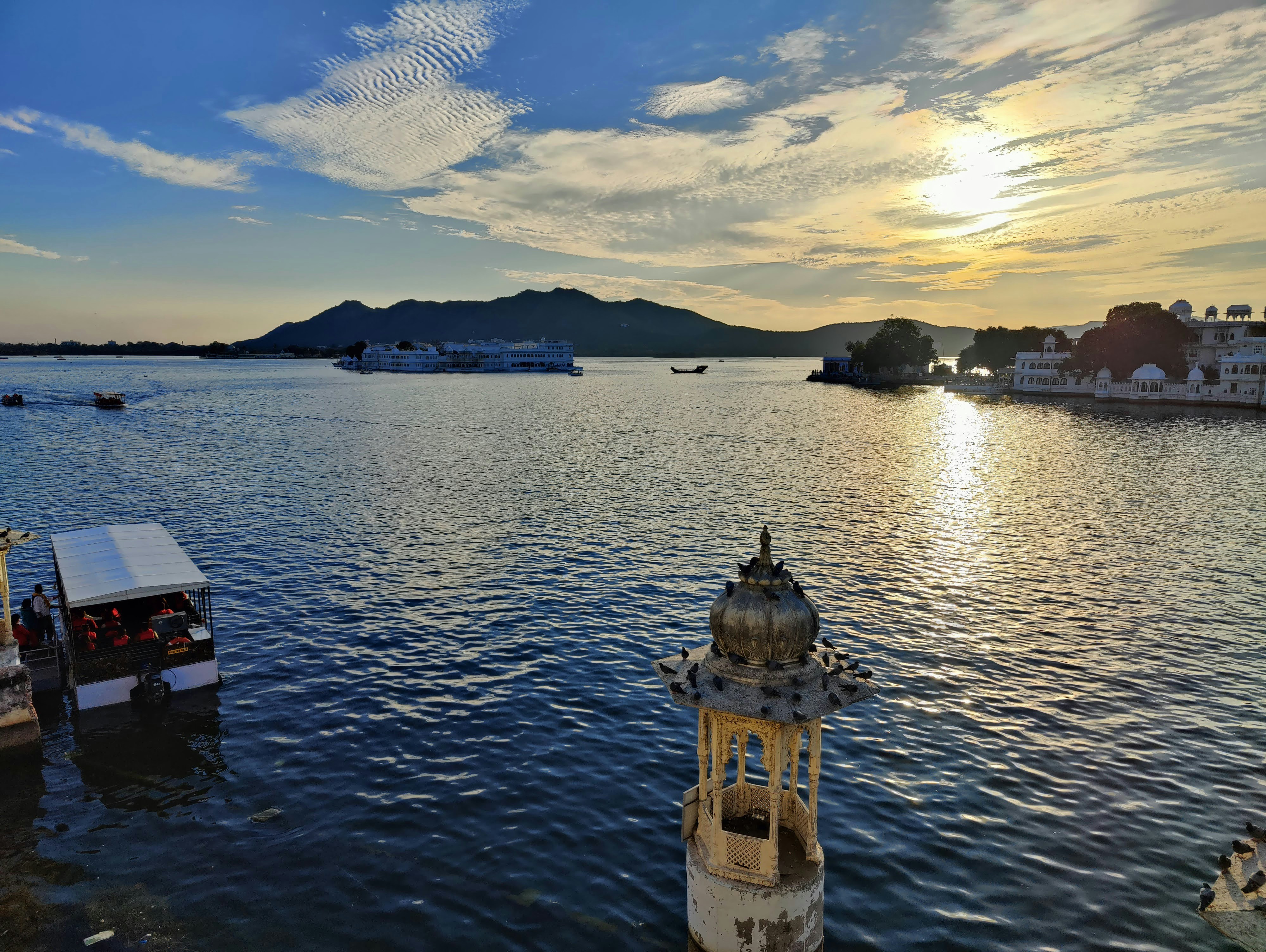 Golden Hour Beacon Over a Tranquil Bay