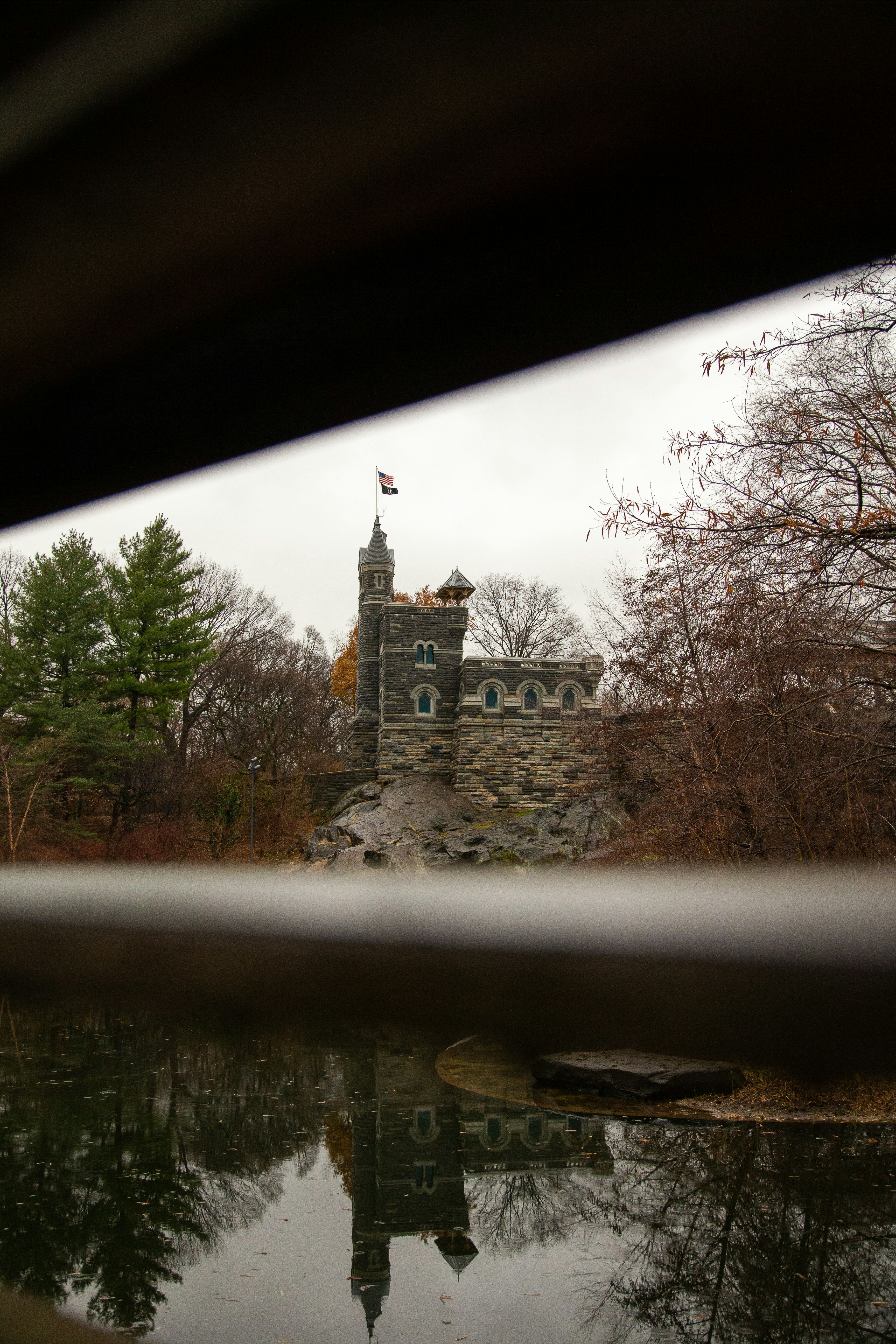 Castle on the Rocks: A Quiet Moment Beneath the Bridge