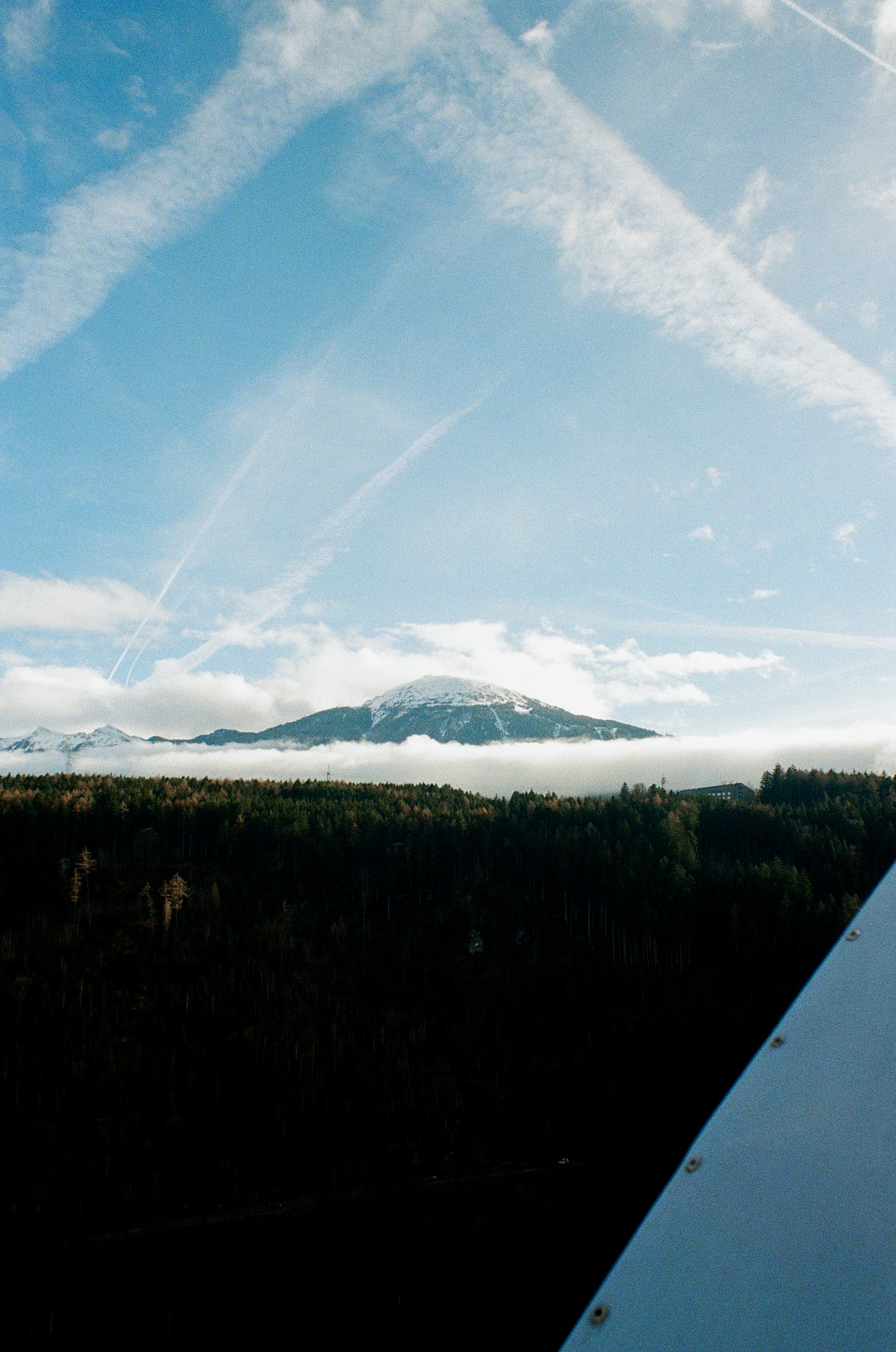 A view of a mountain from a plane window photo – Free Innsbruck Image ...