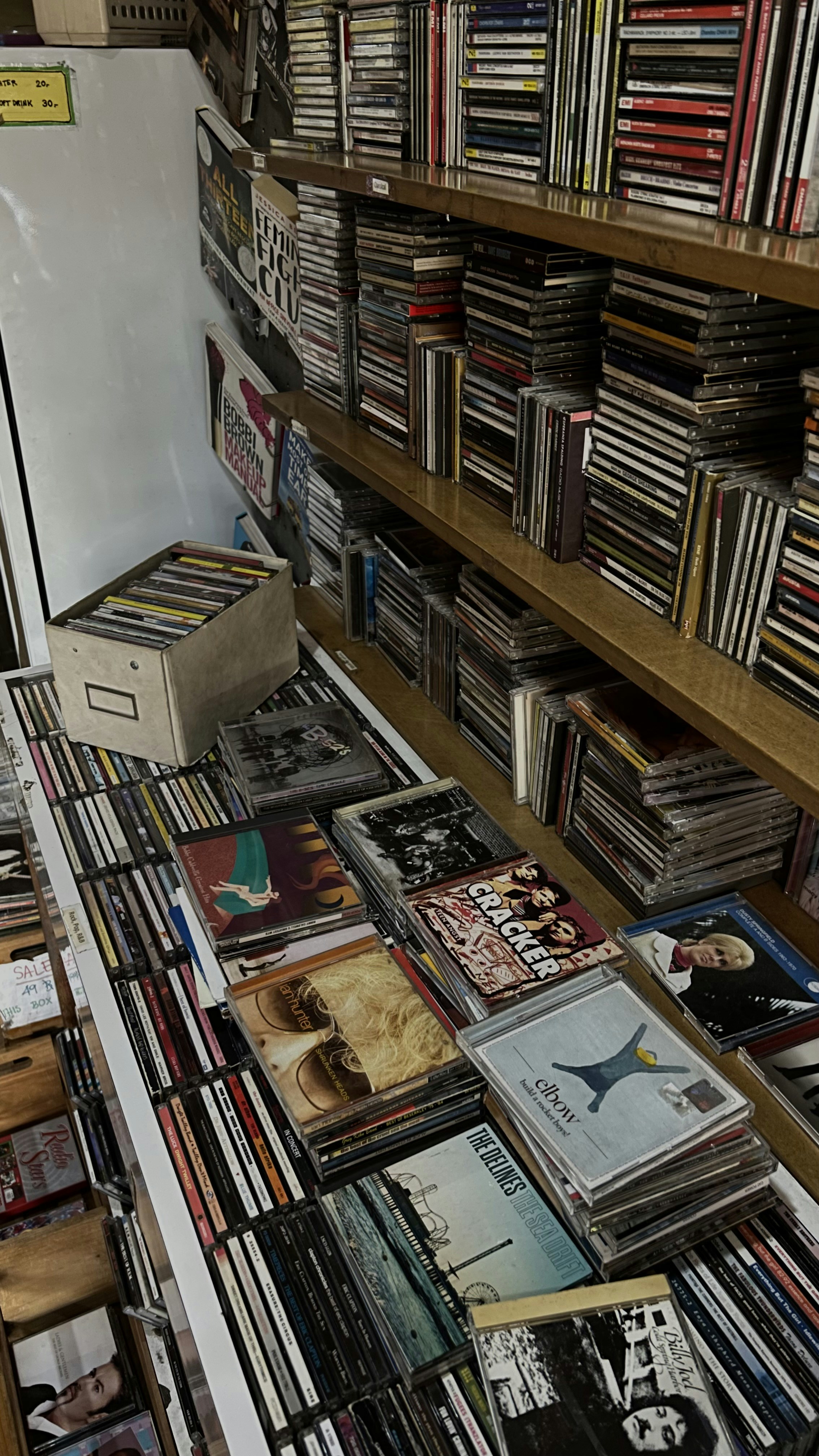 A room filled with lots of records and a refrigerator photo – Free ...