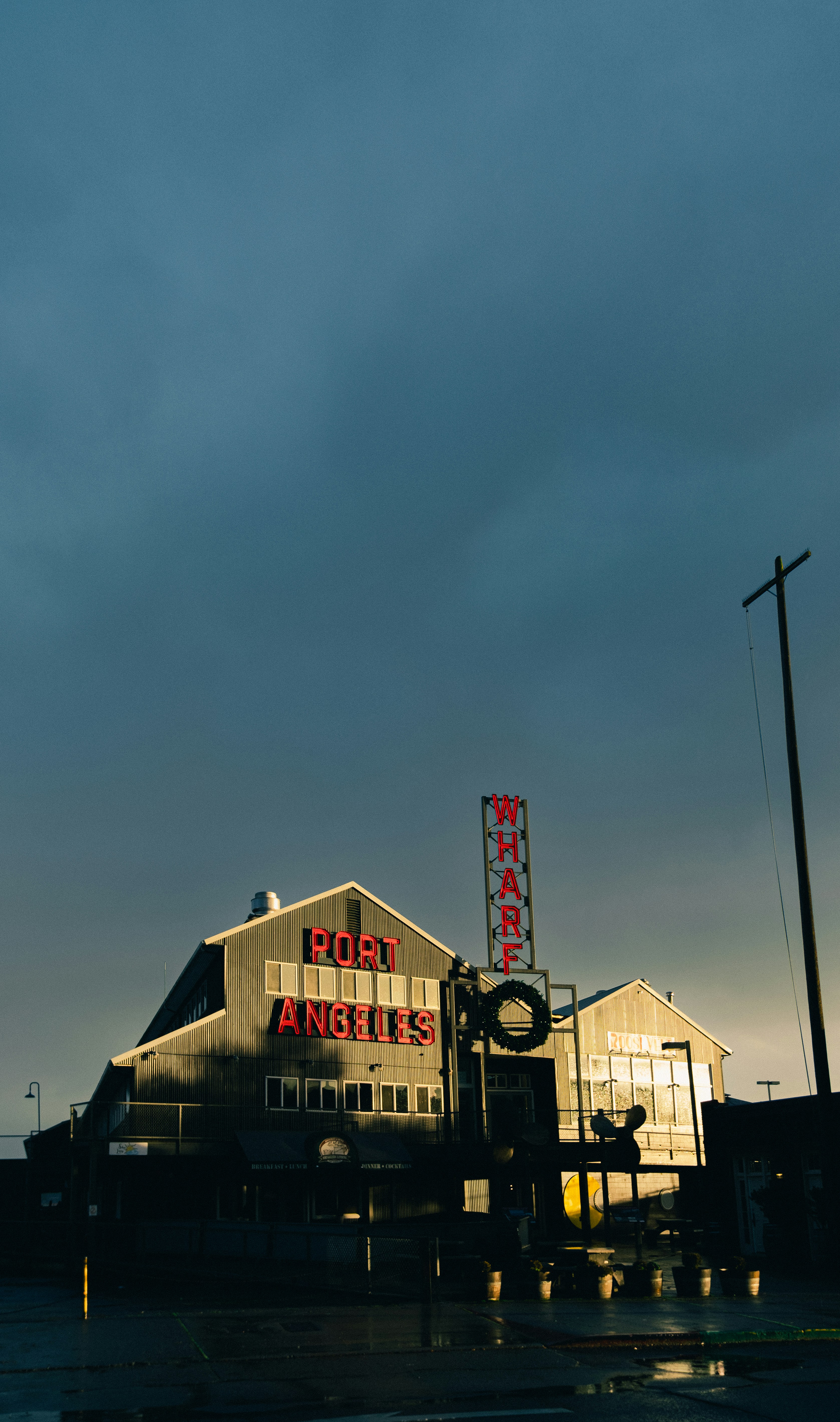 Neon Sign at Port Angeles Wharf at Golden Hour
