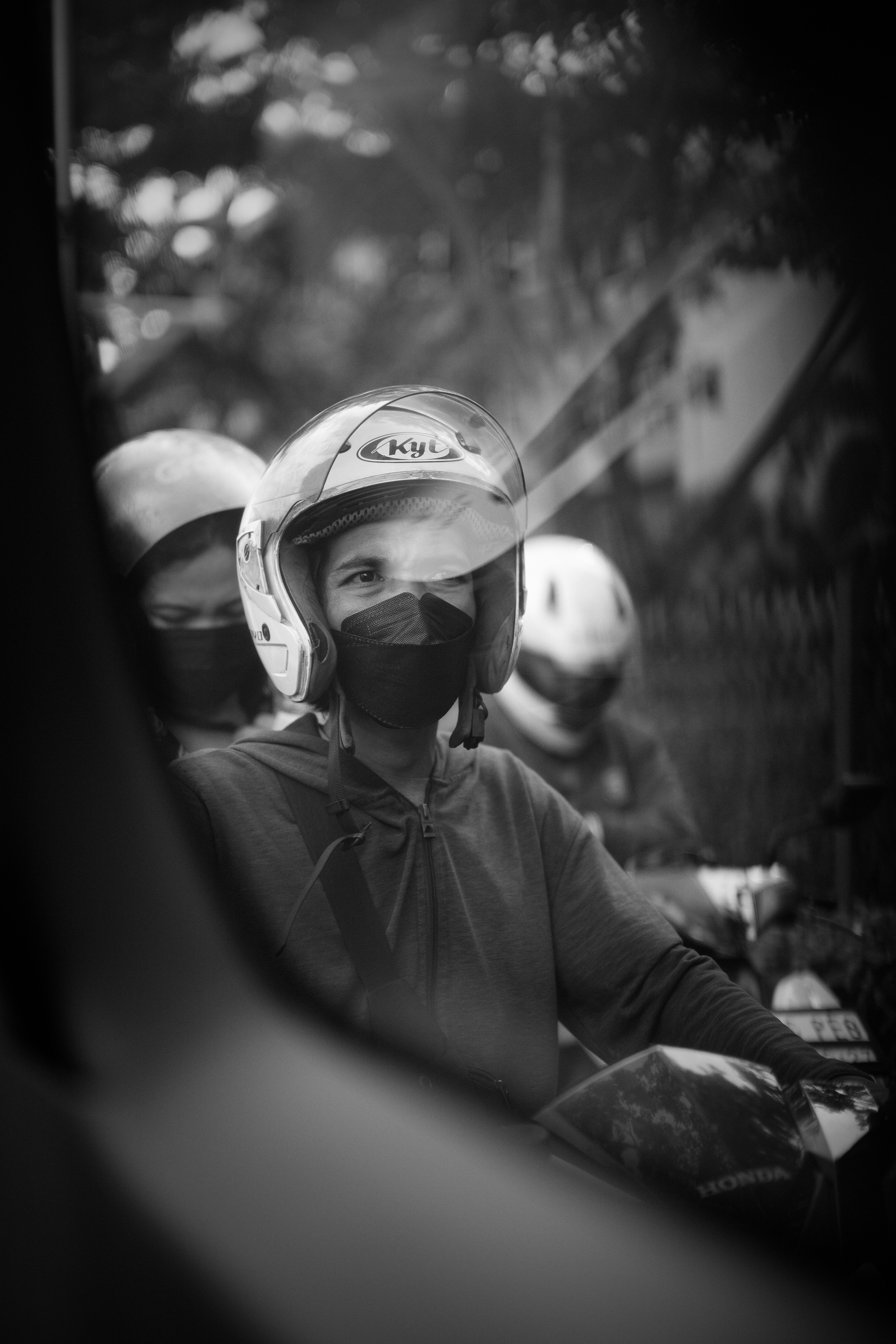 A person wearing a helmet and a face mask photo – Free Helmet Image on ...
