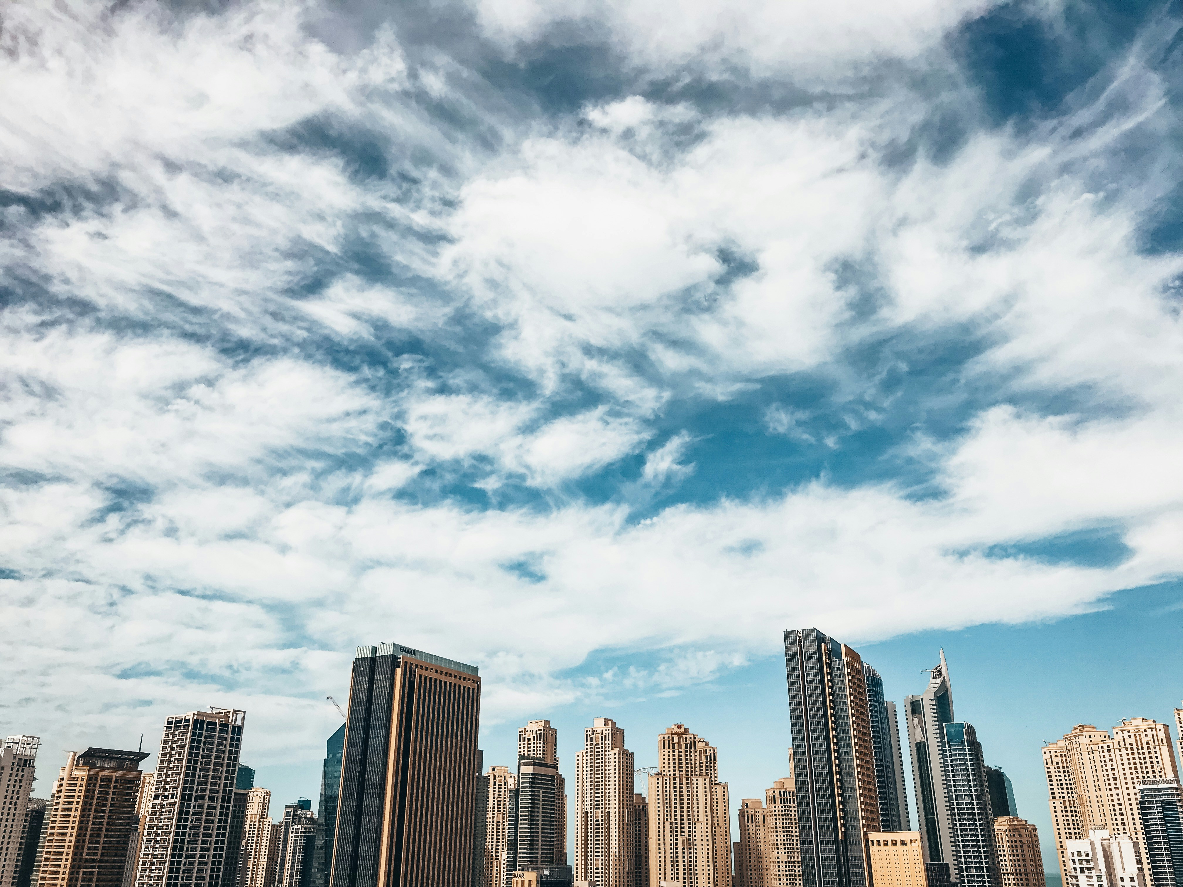 Skyline Constellation: Urban Peaks Under a Patchwork Sky