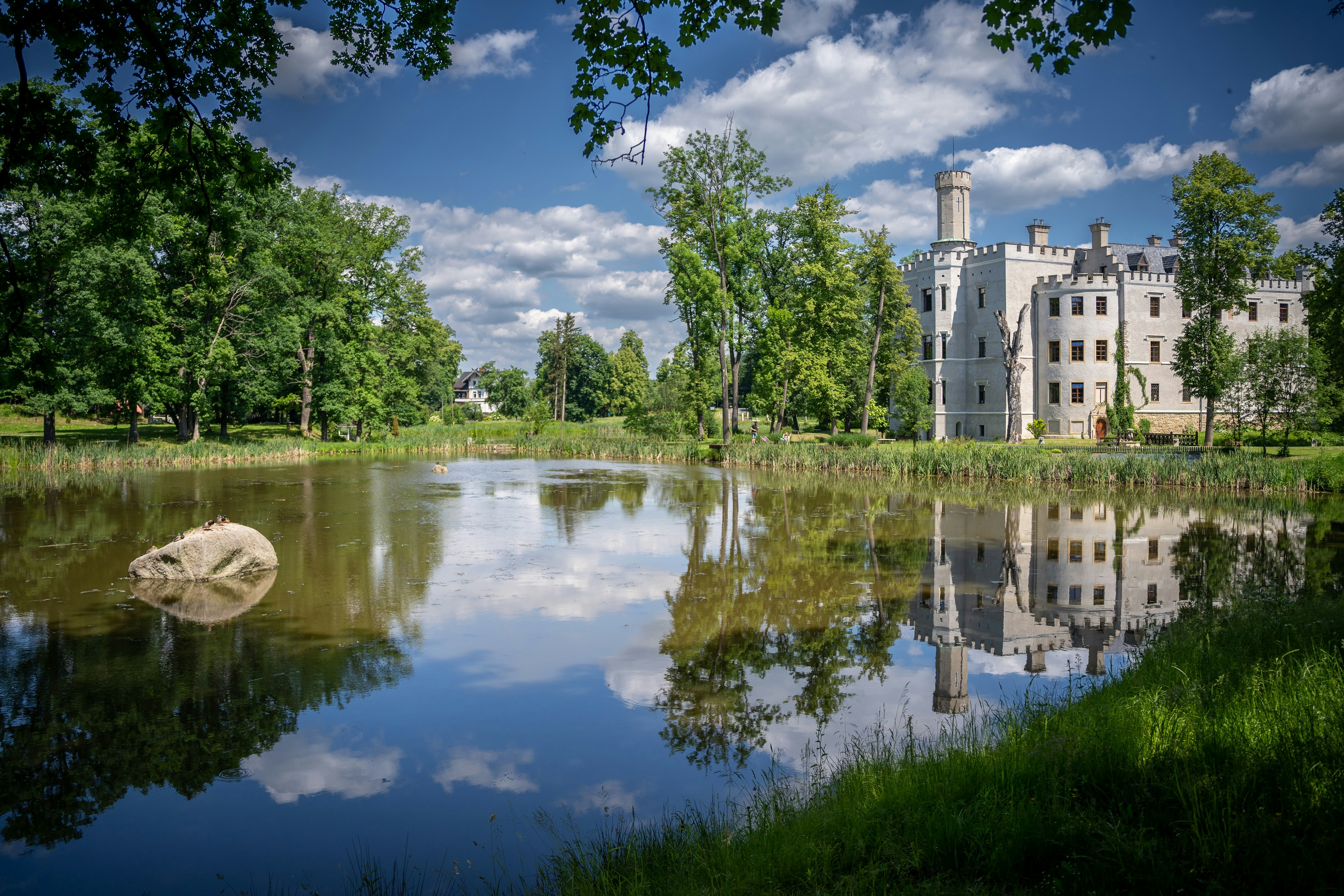 Castle Reflections by a Glassy Pond