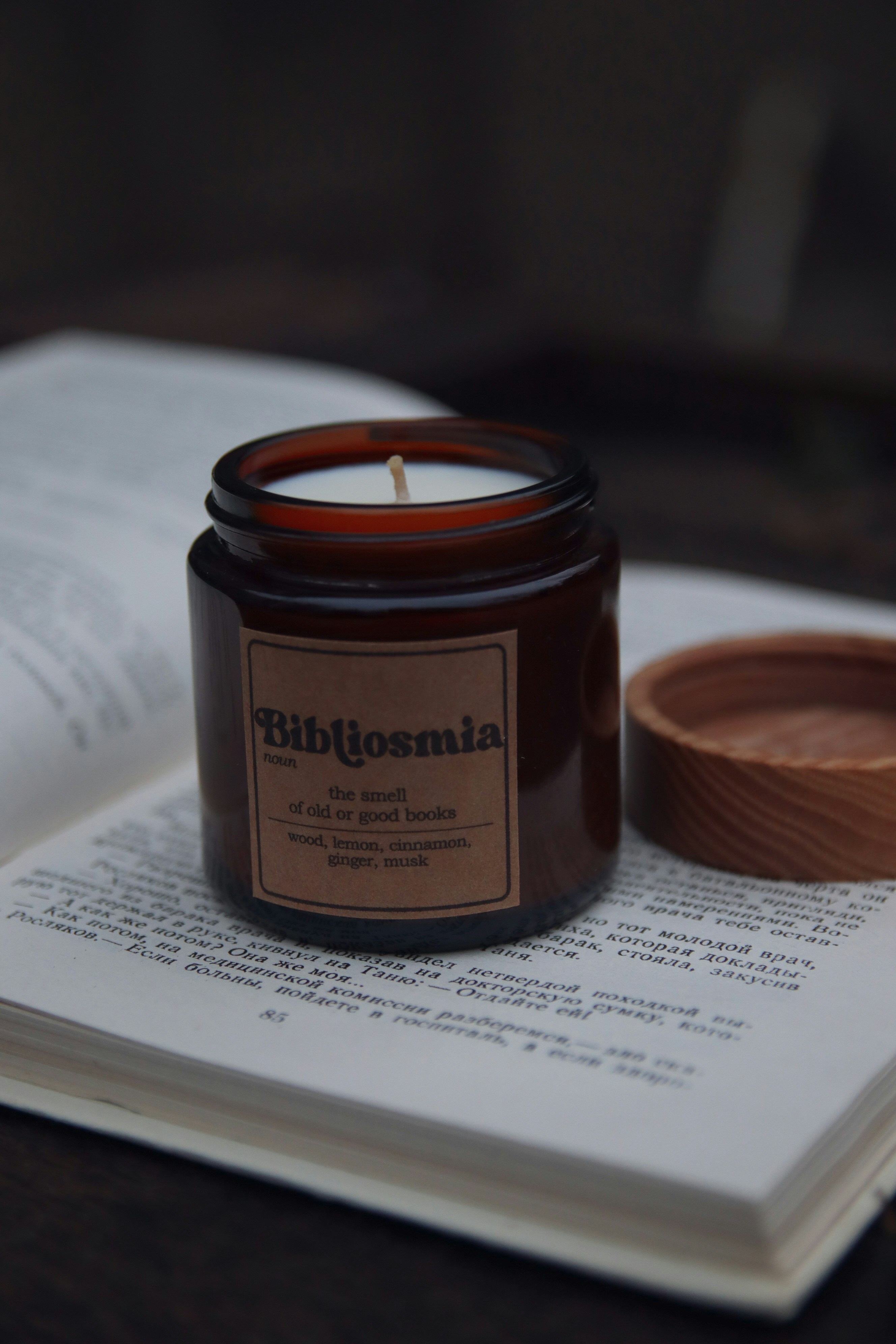 a candle sitting on top of an open book