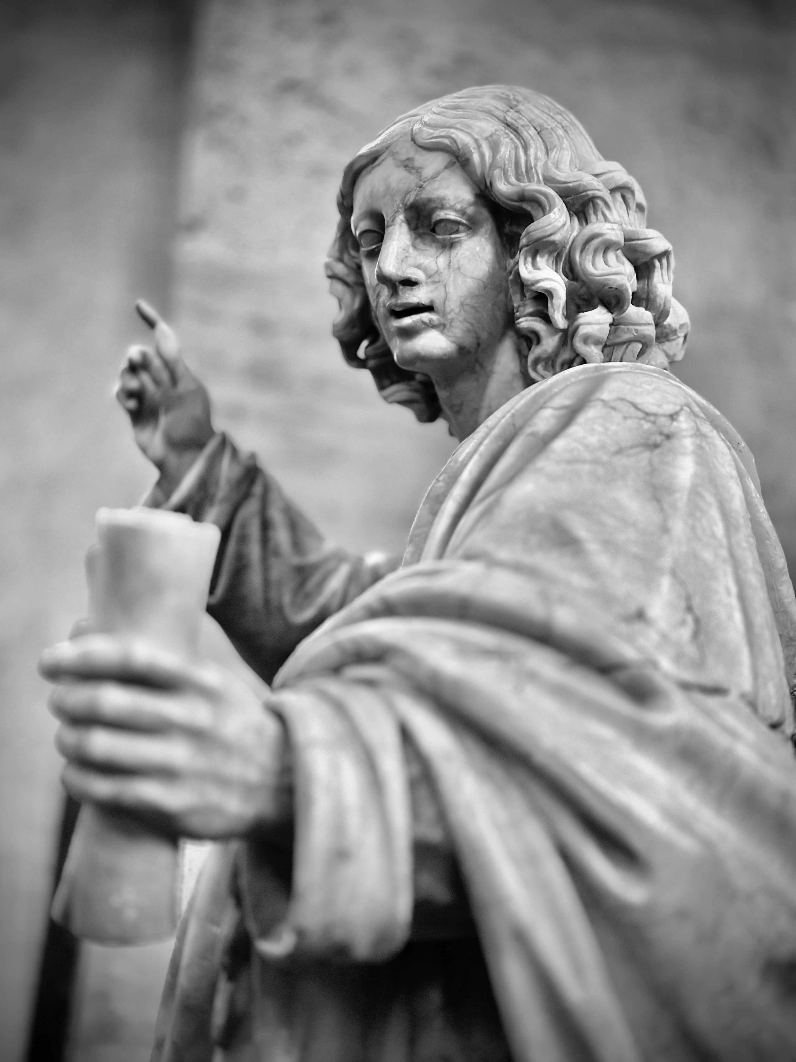 Stone Vigil: A Candle's Quiet Echo in Marble