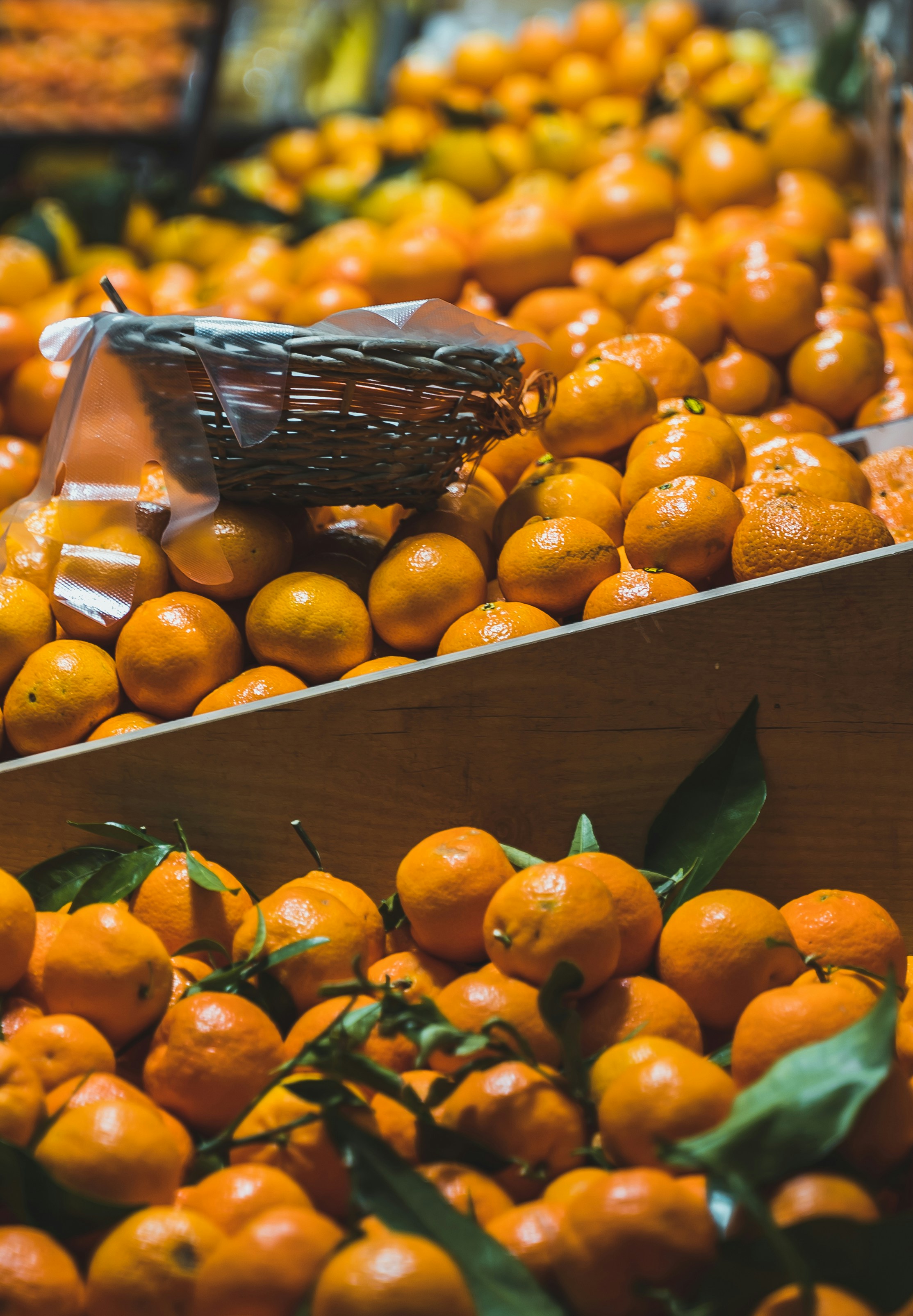 a pile of oranges sitting on top of each other