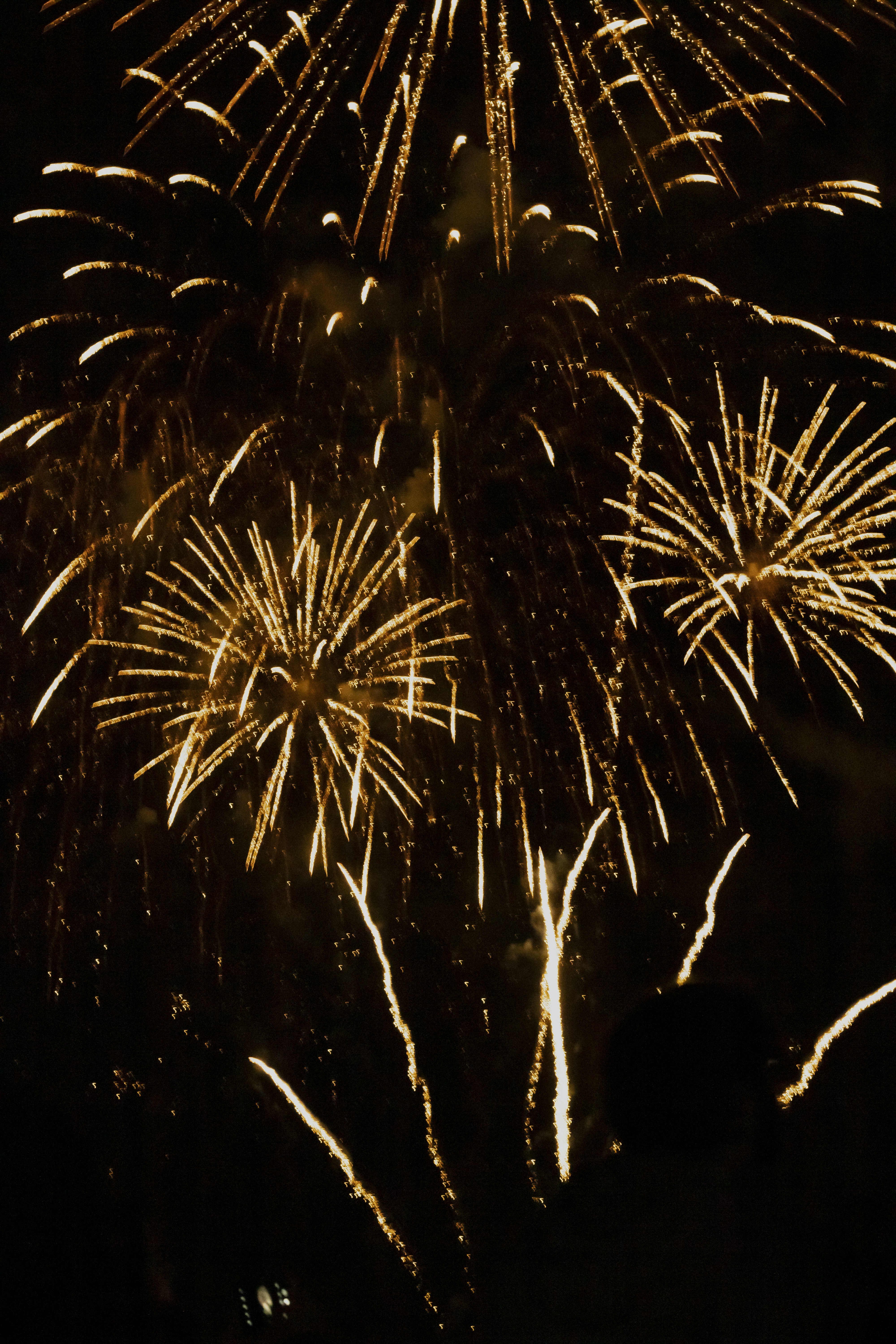A bunch of fireworks are lit up in the night sky photo – Free Fireworks ...