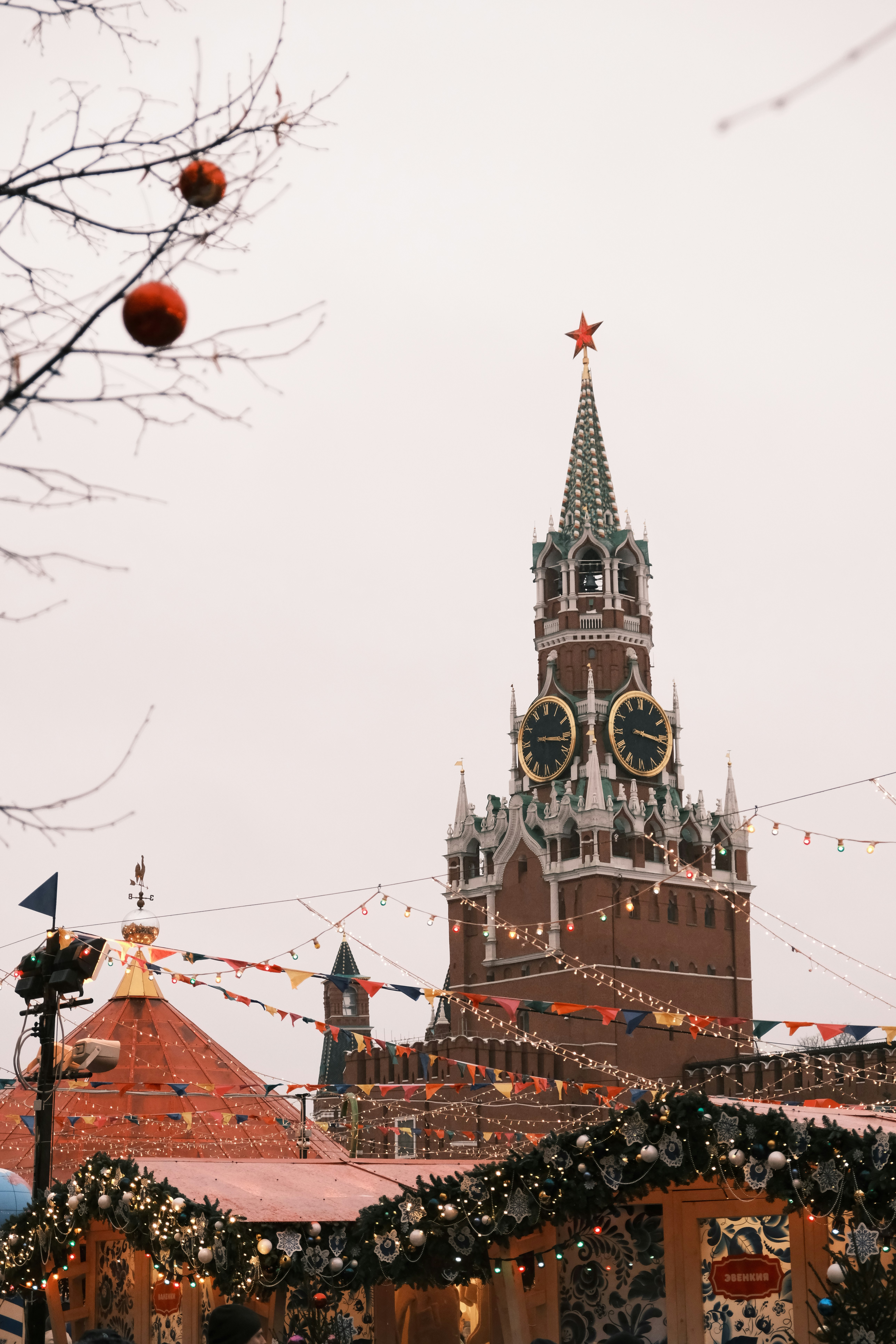 Spasskaya Tower Under Fairy Lights: A Moscow Christmas Market Portrait