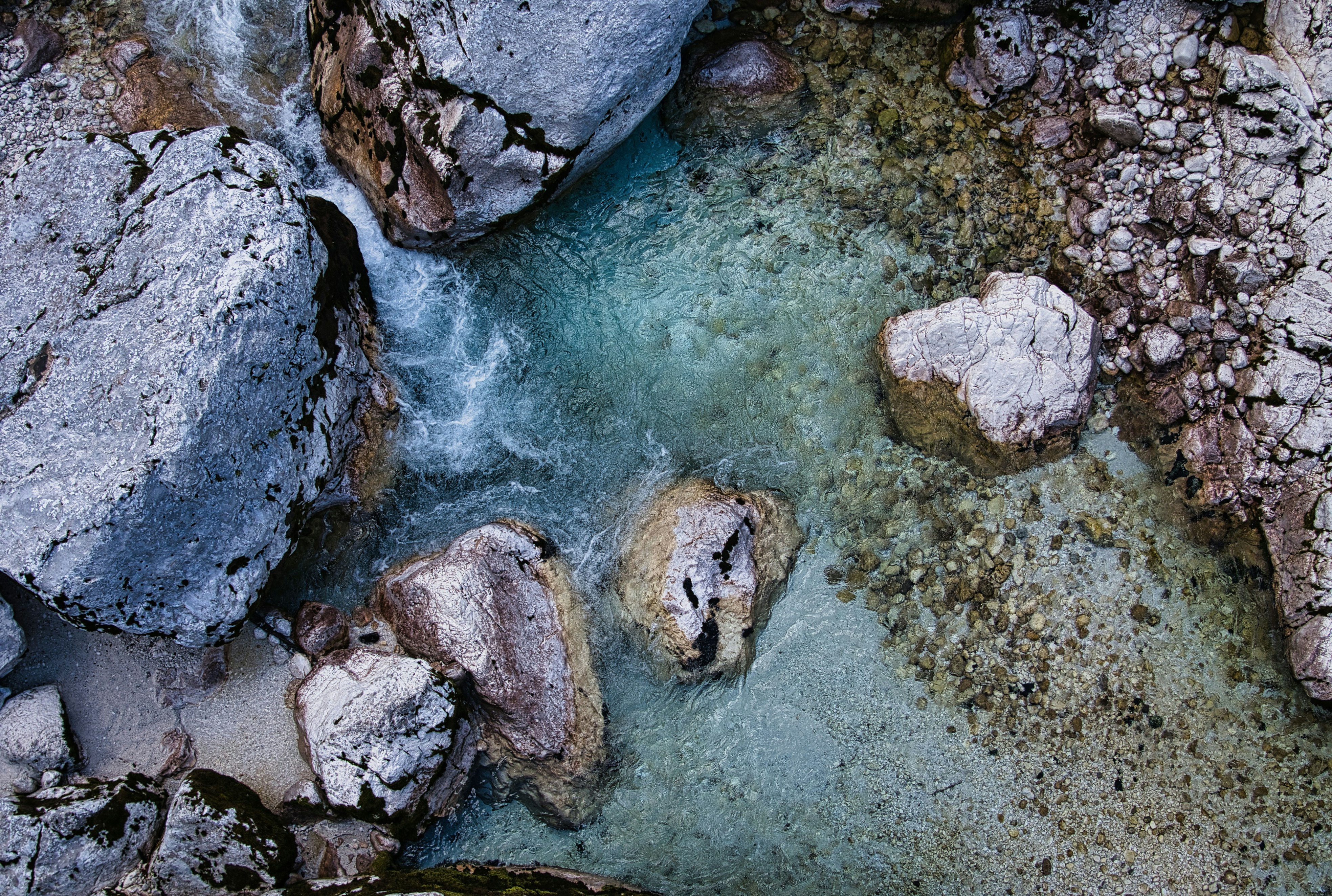 A small stream of water surrounded by rocks photo – Free Slovenia Image ...