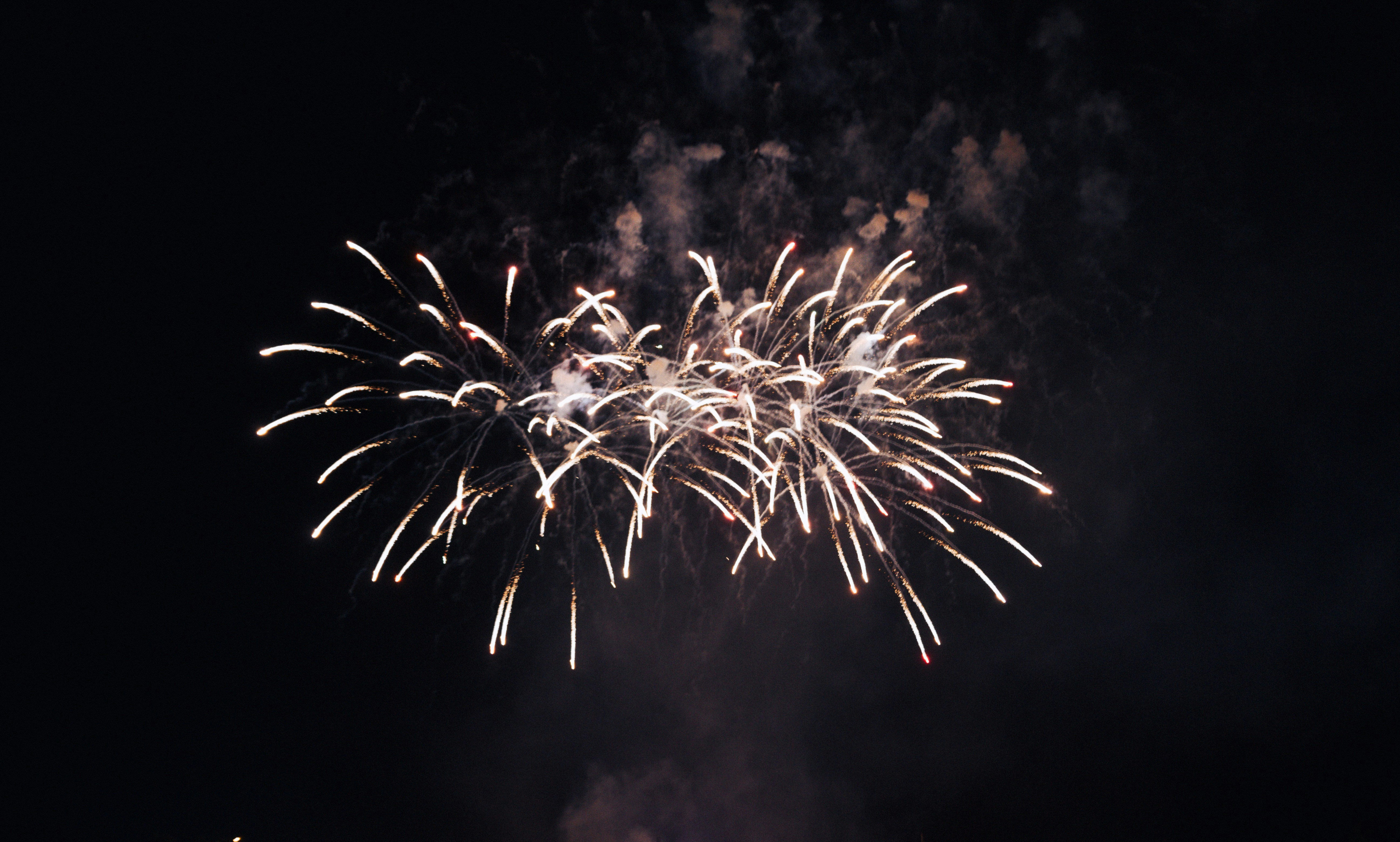 A large fireworks is lit up in the night sky photo – Free Nürburgring ...