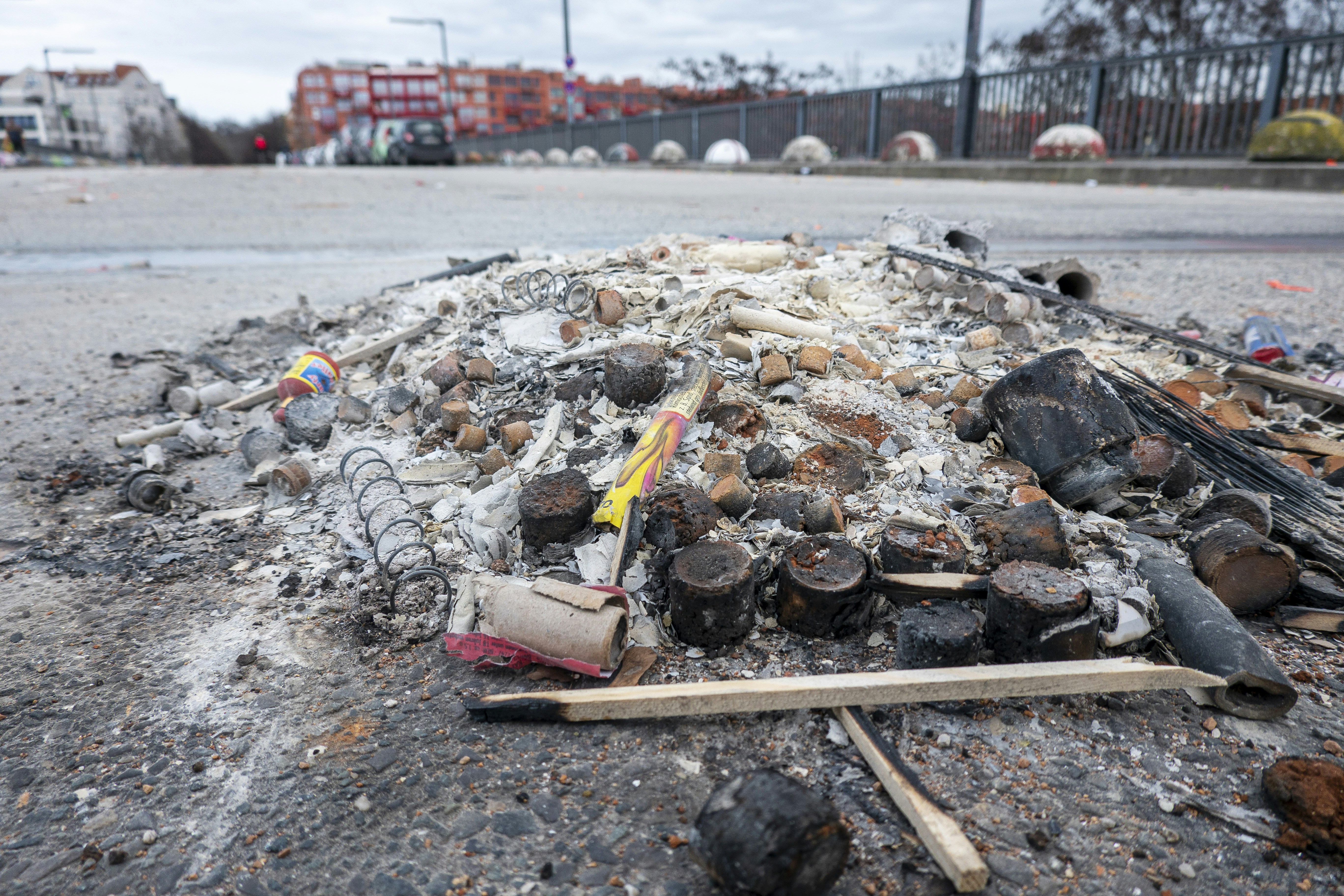 A pile of trash sitting on the side of a road photo – Free Smoke Image ...