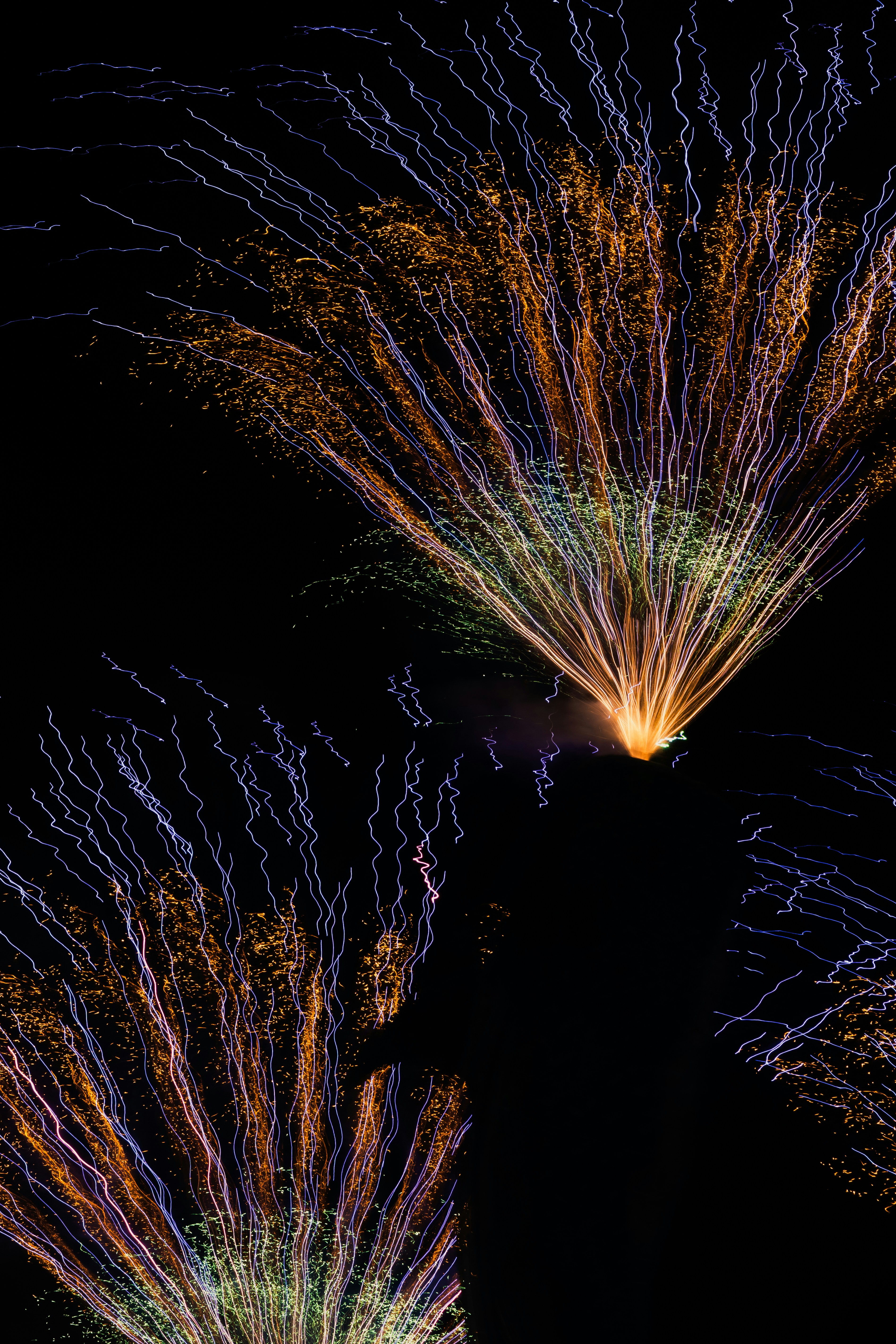 A bunch of fireworks are lit up in the night sky photo – Free Night ...