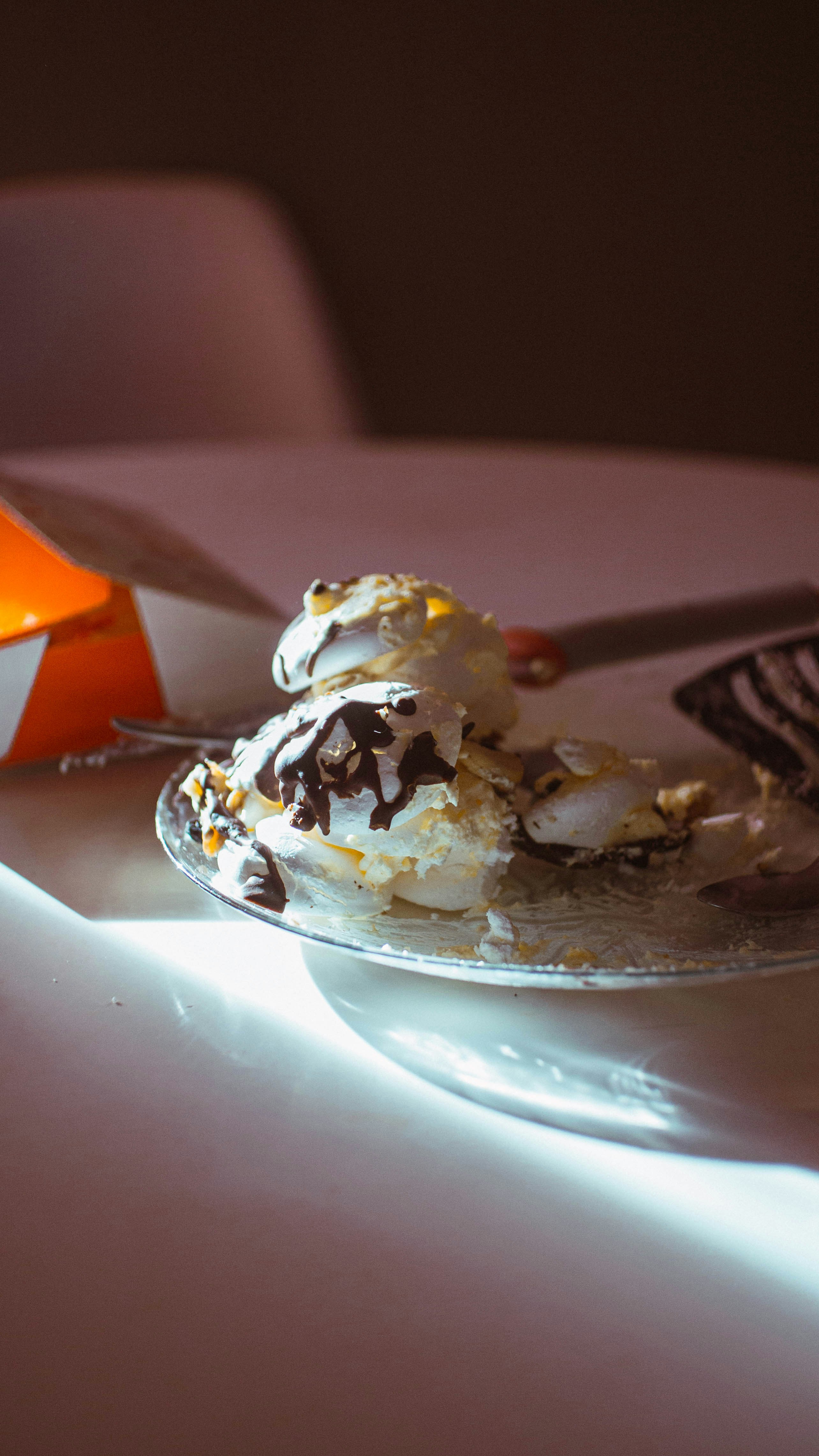 A Slice of Creamy Indulgence under Soft Dinner Lighting
