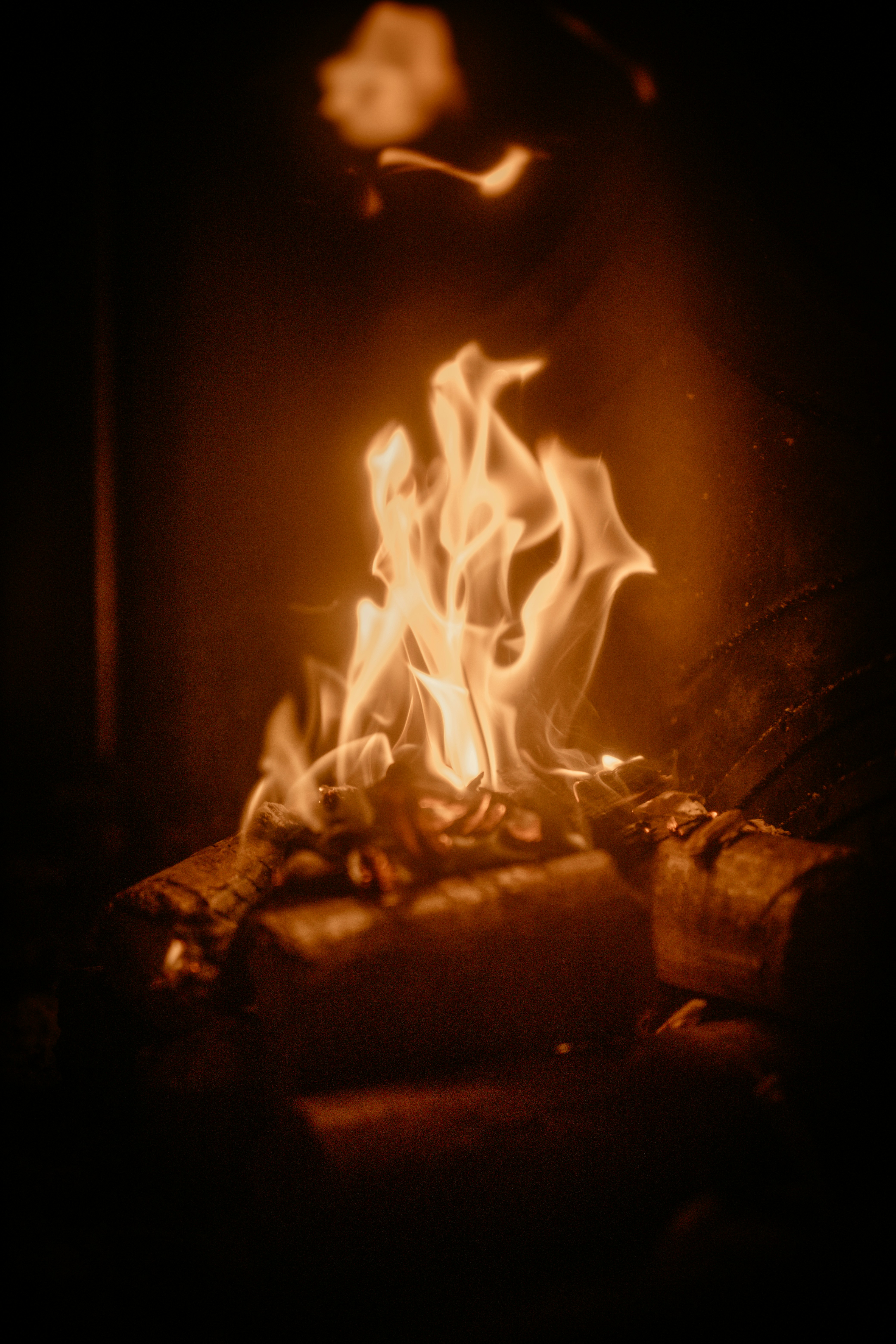 A close up of a fire burning in a fireplace photo – Free Fire Image on ...