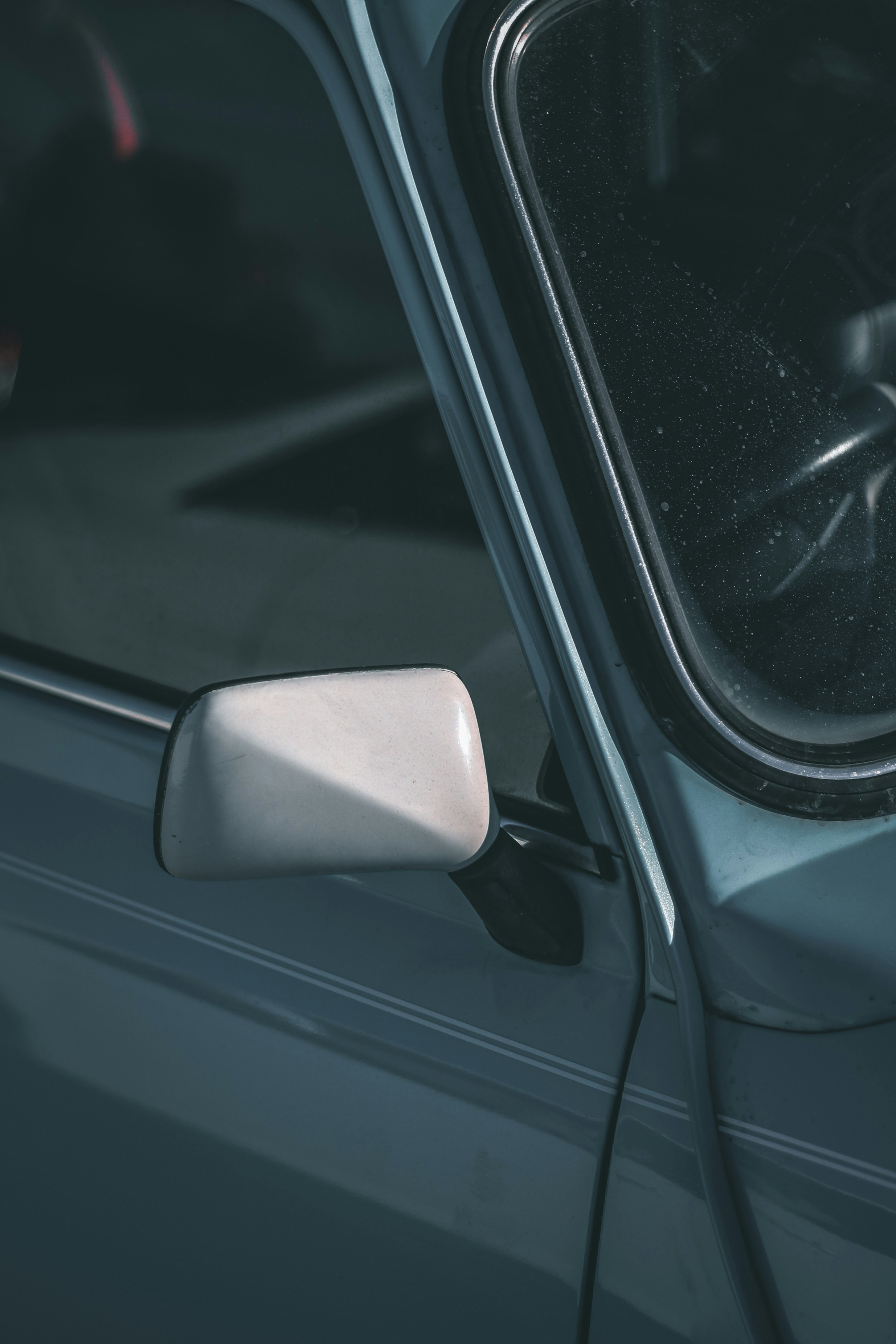 a side view mirror on the side of a car