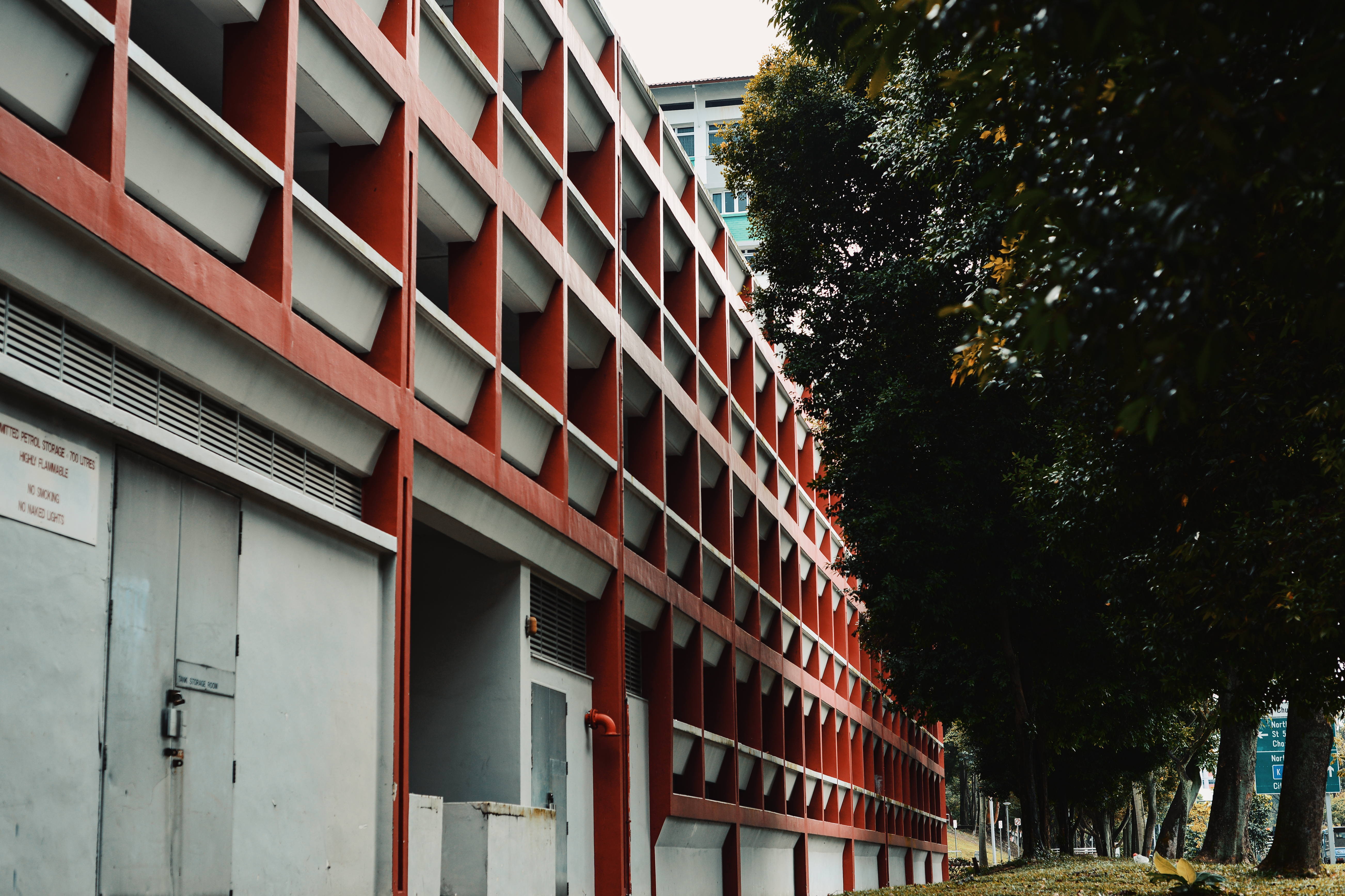Red-Rimmed Courtyard: Row of Geometry and Shade