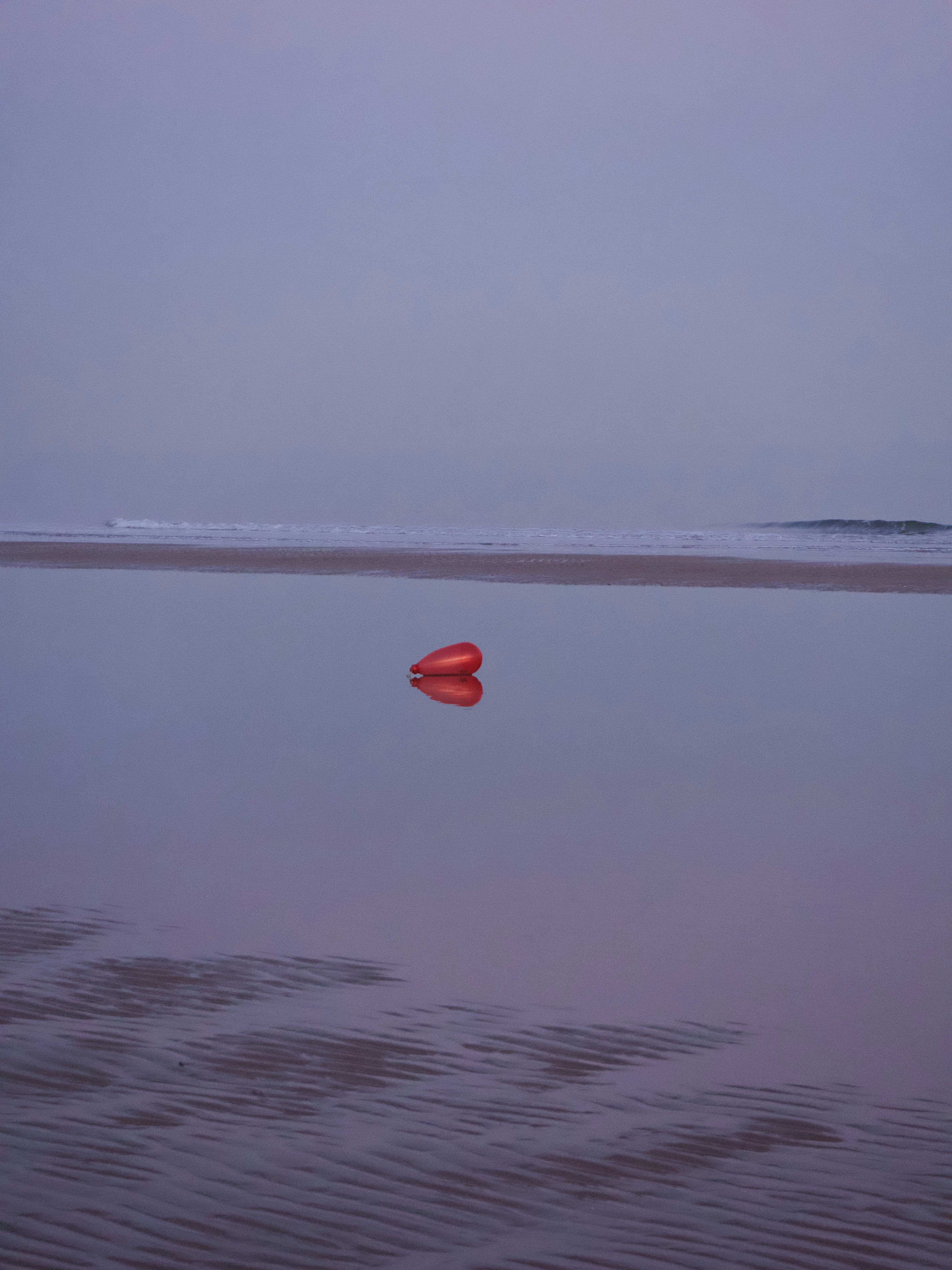 Scarlet Balloon on a Mirror-Tide at Dusk