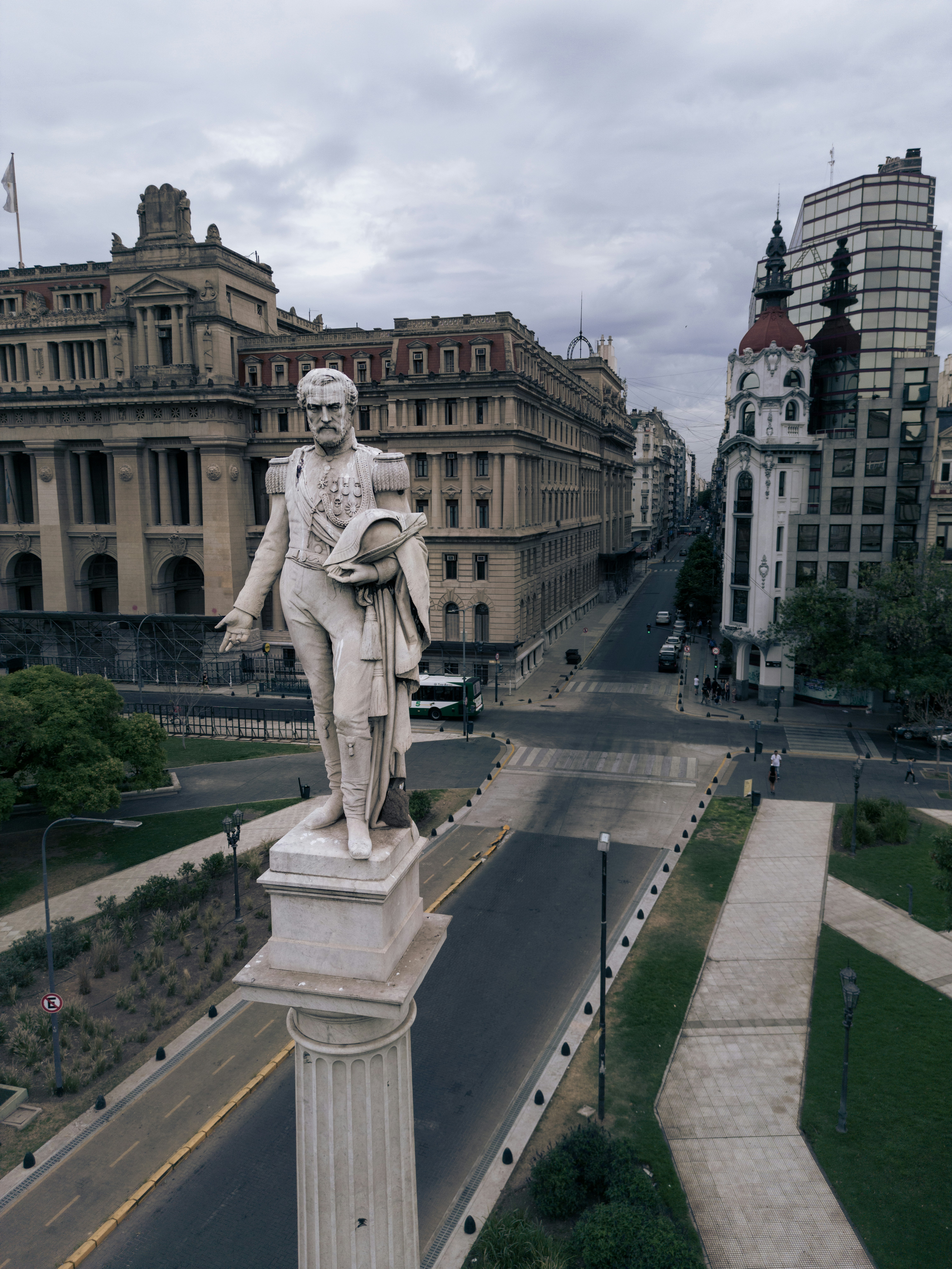 Stone Sentinel Over a City Boulevard