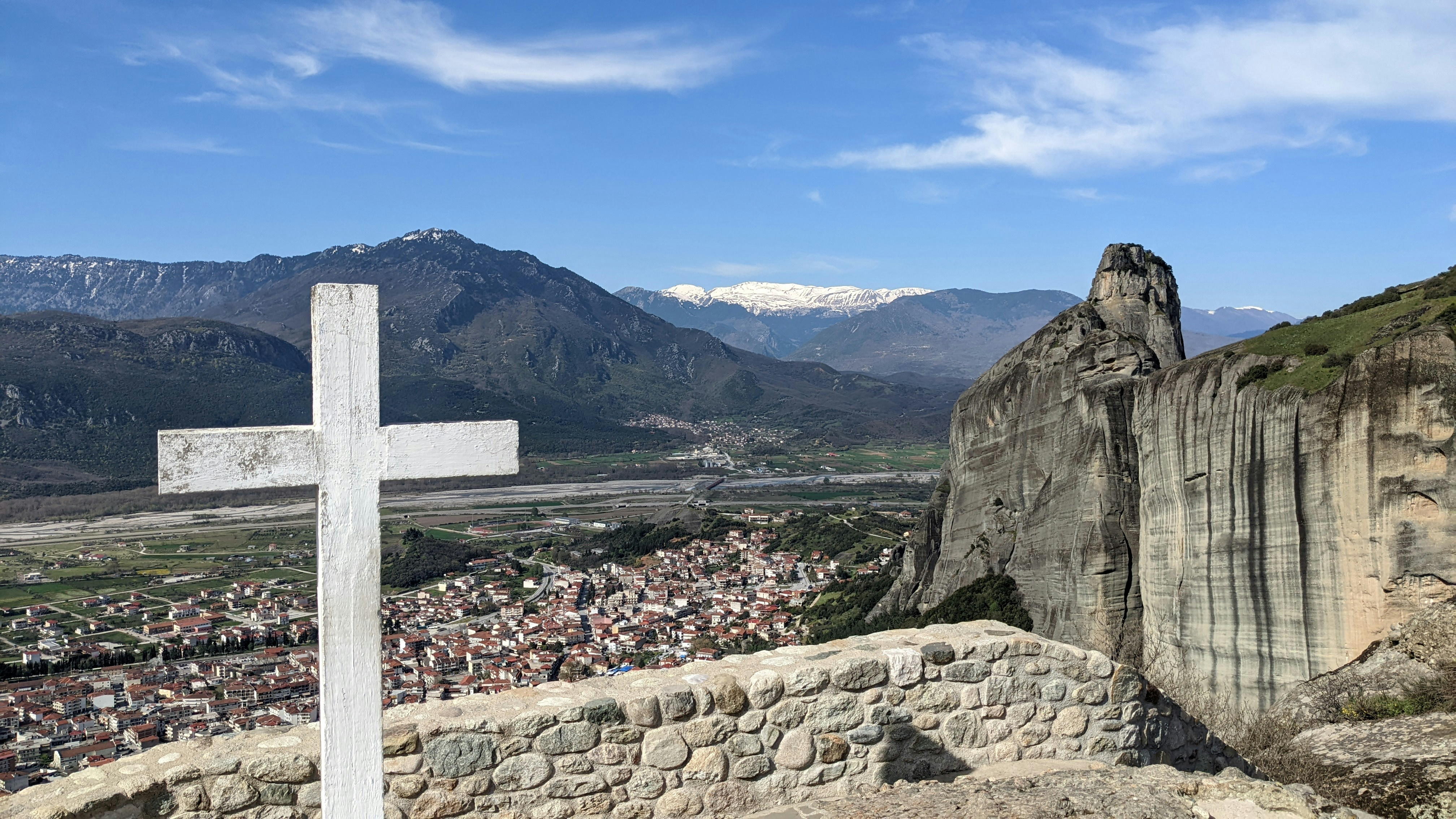 Stone Cross Overlooking a Valley of Tufts and Cliffs