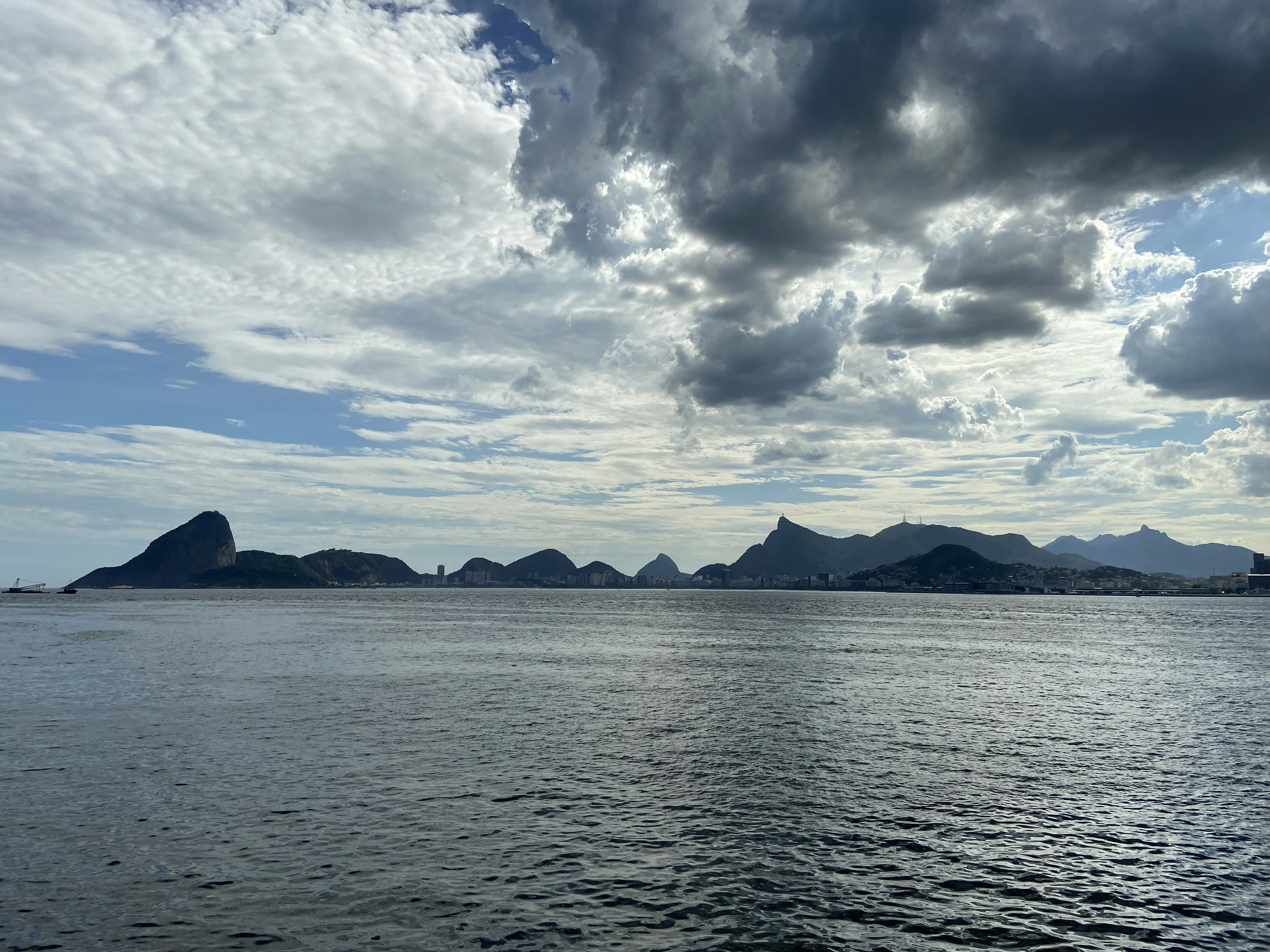 Cloud Symphony Over Rio's Silhouette