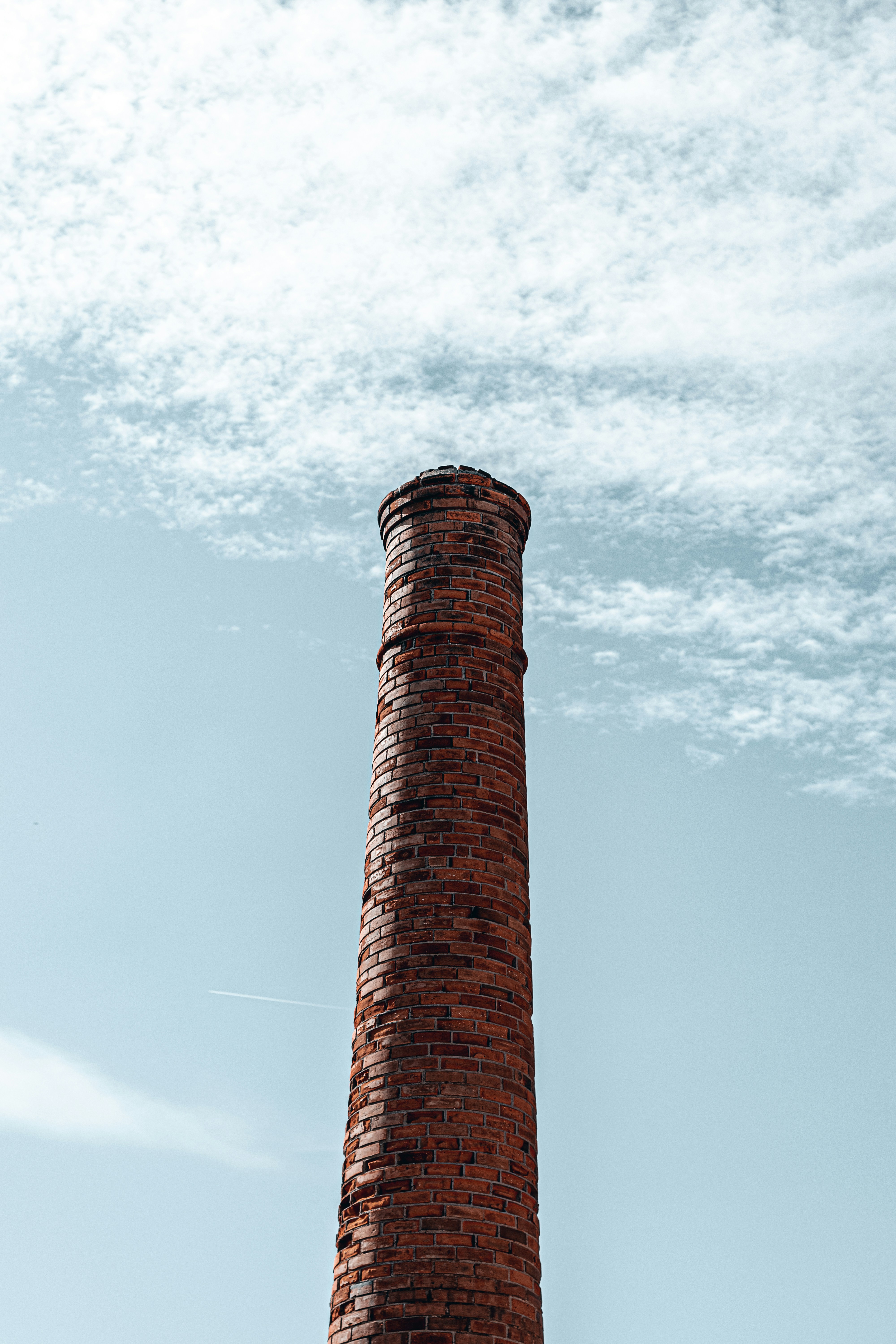 A tall brick chimney with a sky background photo – Free Brick Image on ...