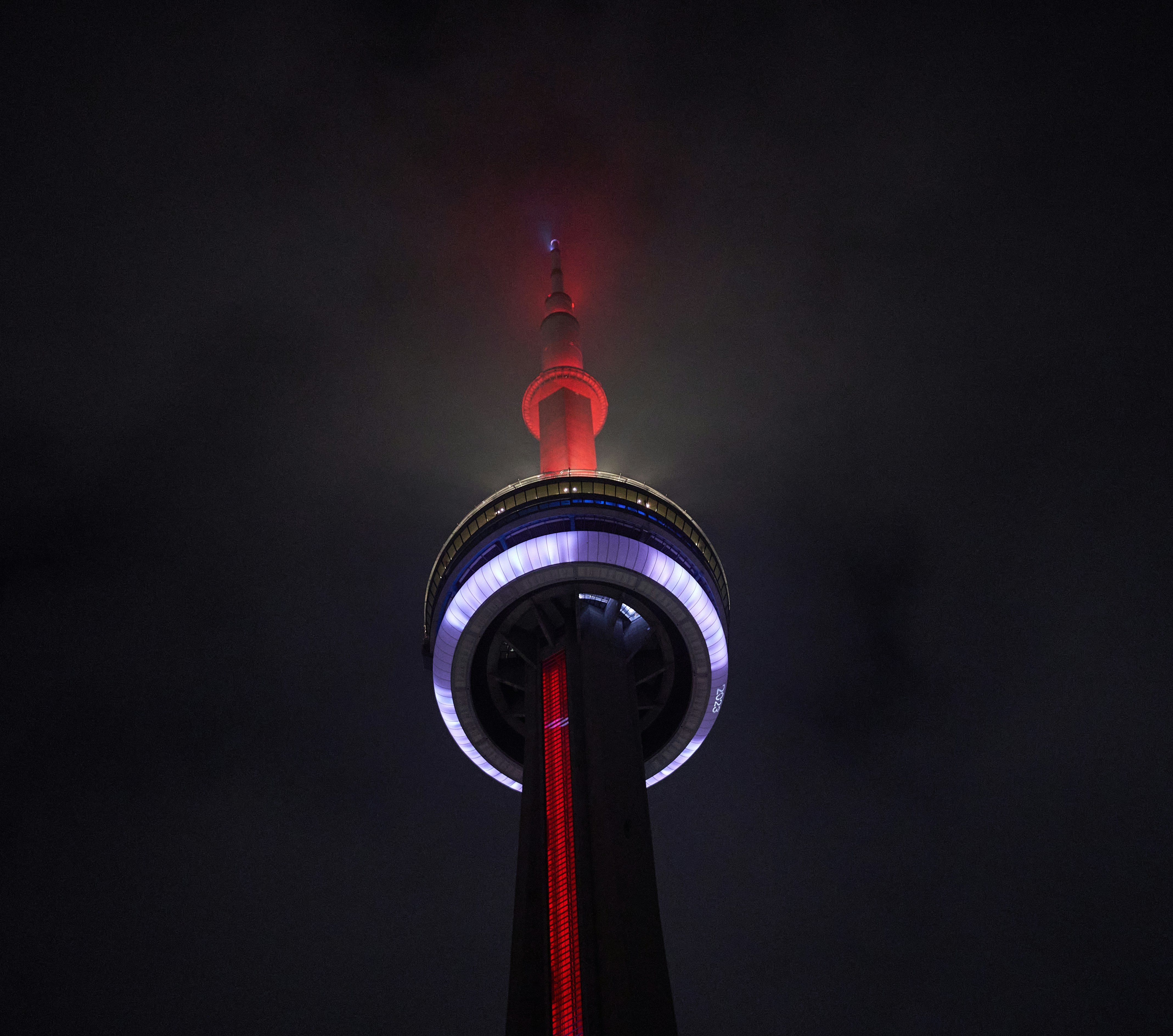 A tall tower with a red light on top of it photo – Free Architecture ...