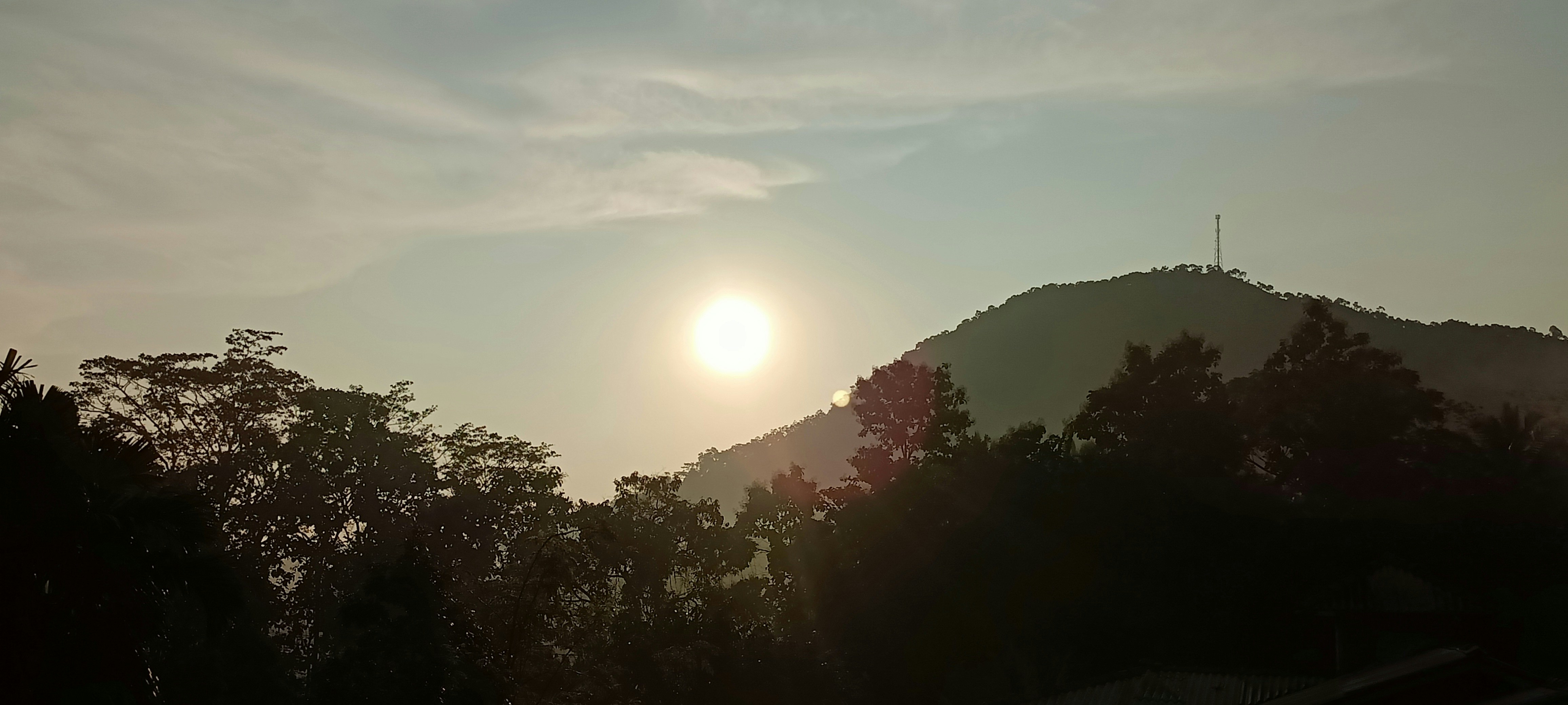 Sunlit Ridge: Quiet Silhouette Under a Gentle Dusk