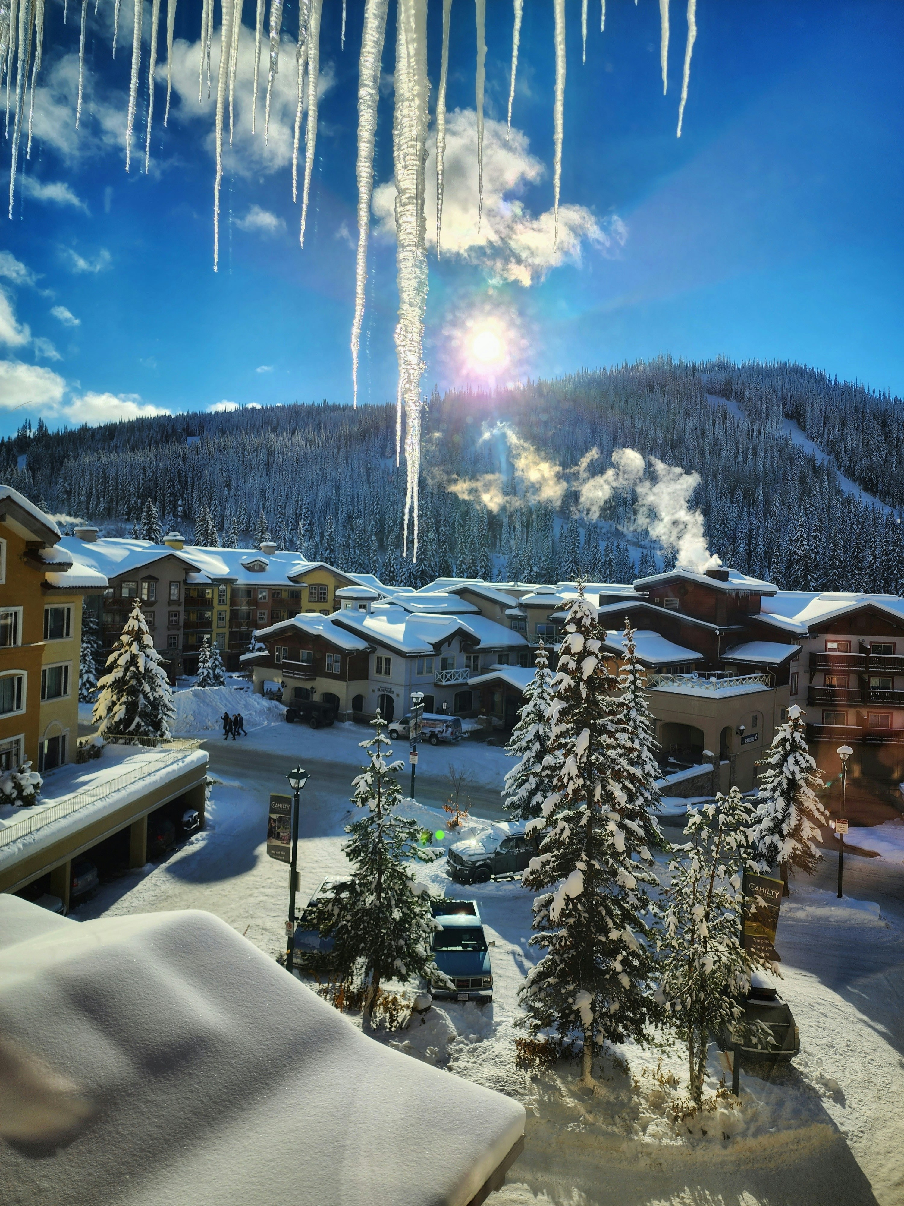 Icicles at Noon Over a Snowbound Alpine Village