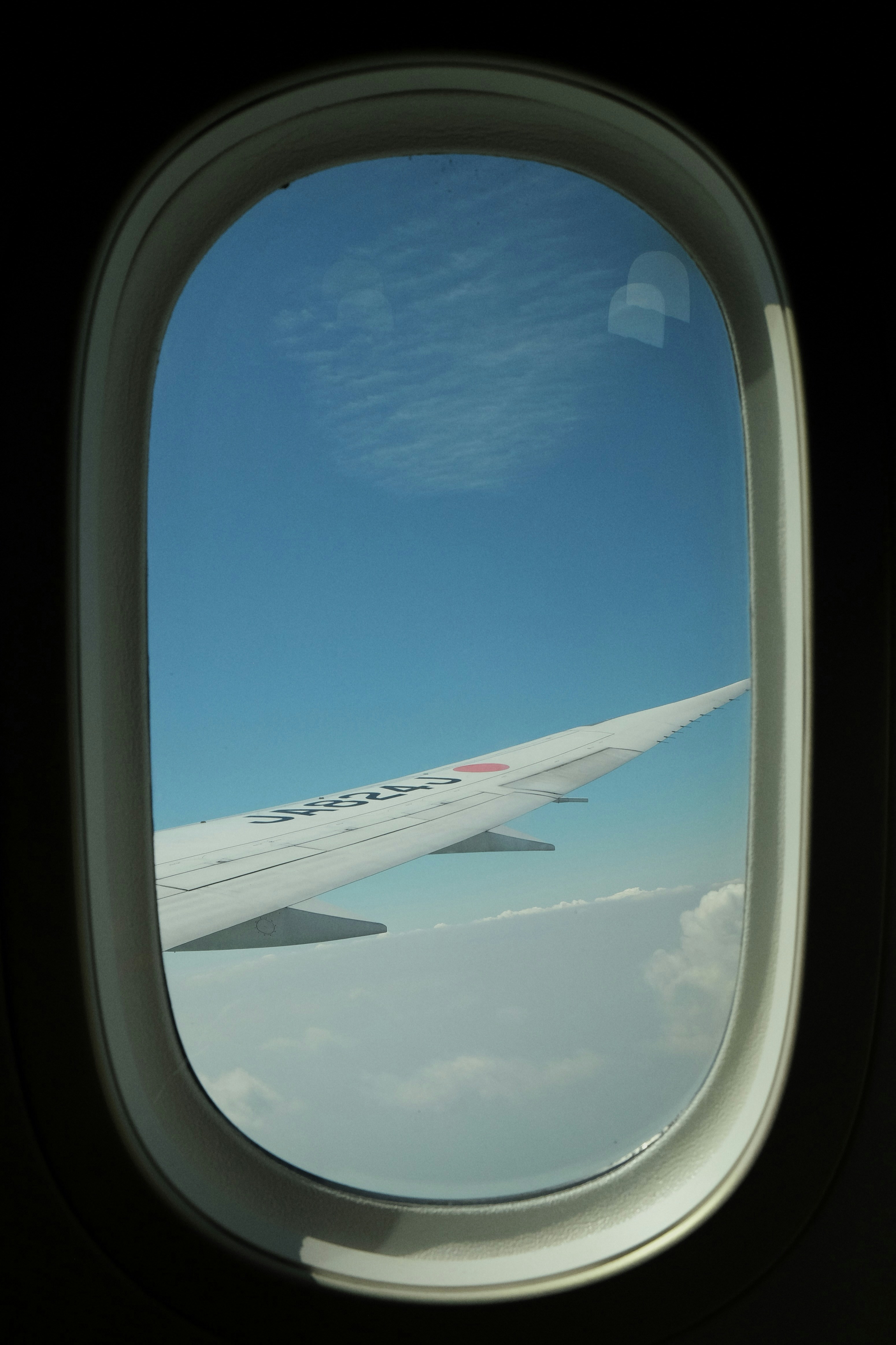 A view of the wing of an airplane through a window photo – Free Travel ...