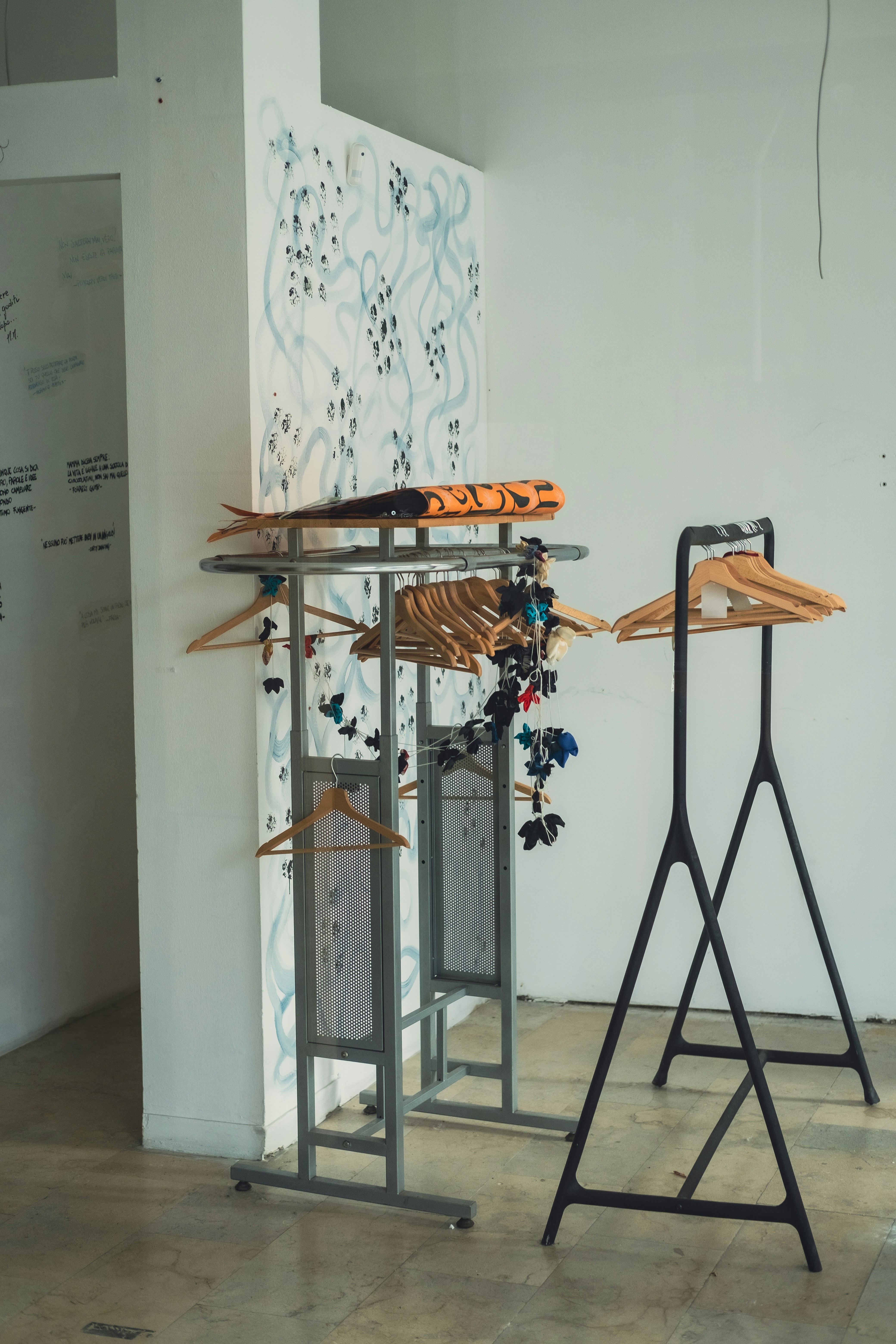 Studio Standstill: A Quiet Clothing Rack in Soft Studio Light