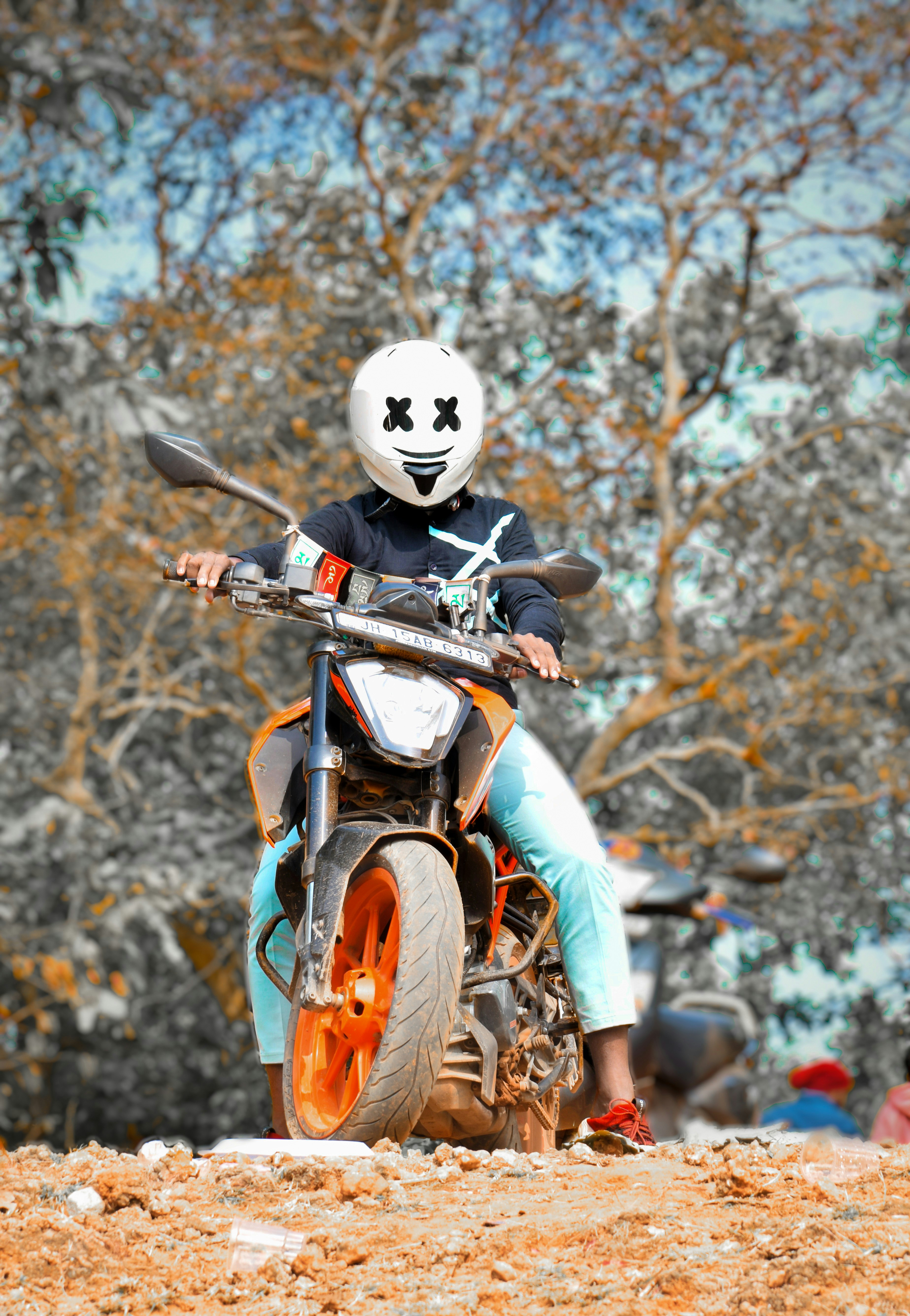 Masked Rider on a Fiery Orange Track