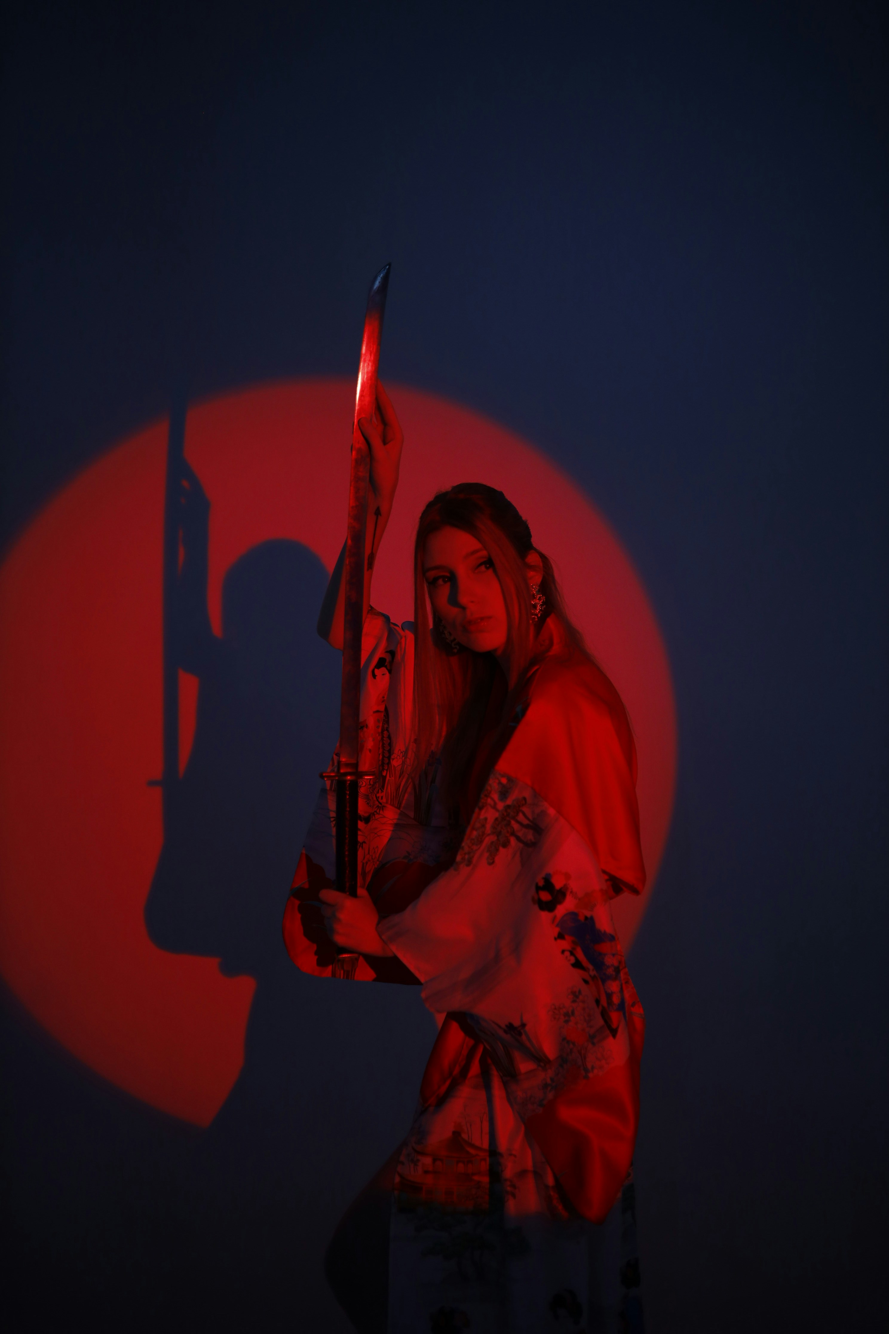 Shadowed Samurai in a Crimson Spotlight