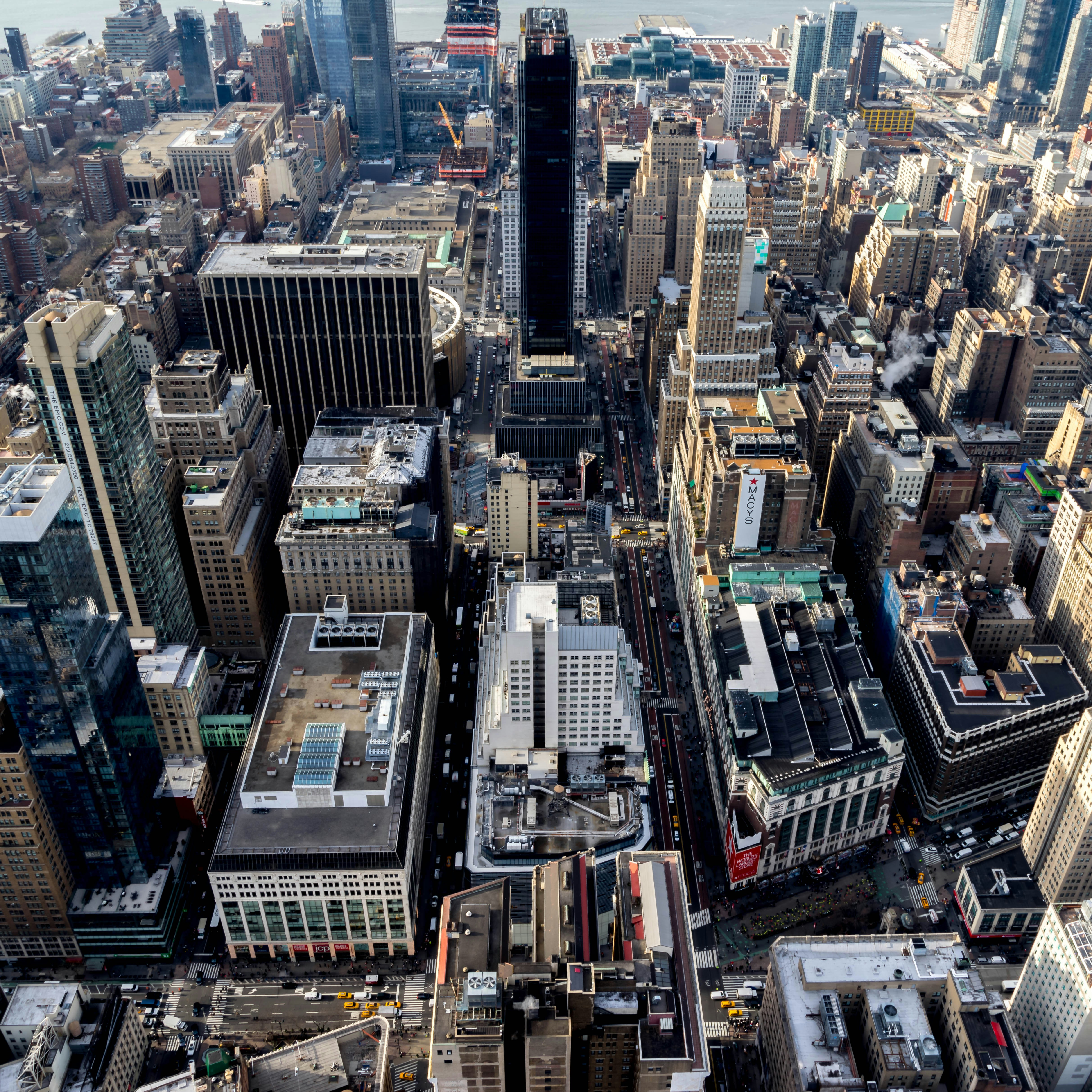 An aerial view of a city with tall buildings photo – Free Empire state ...