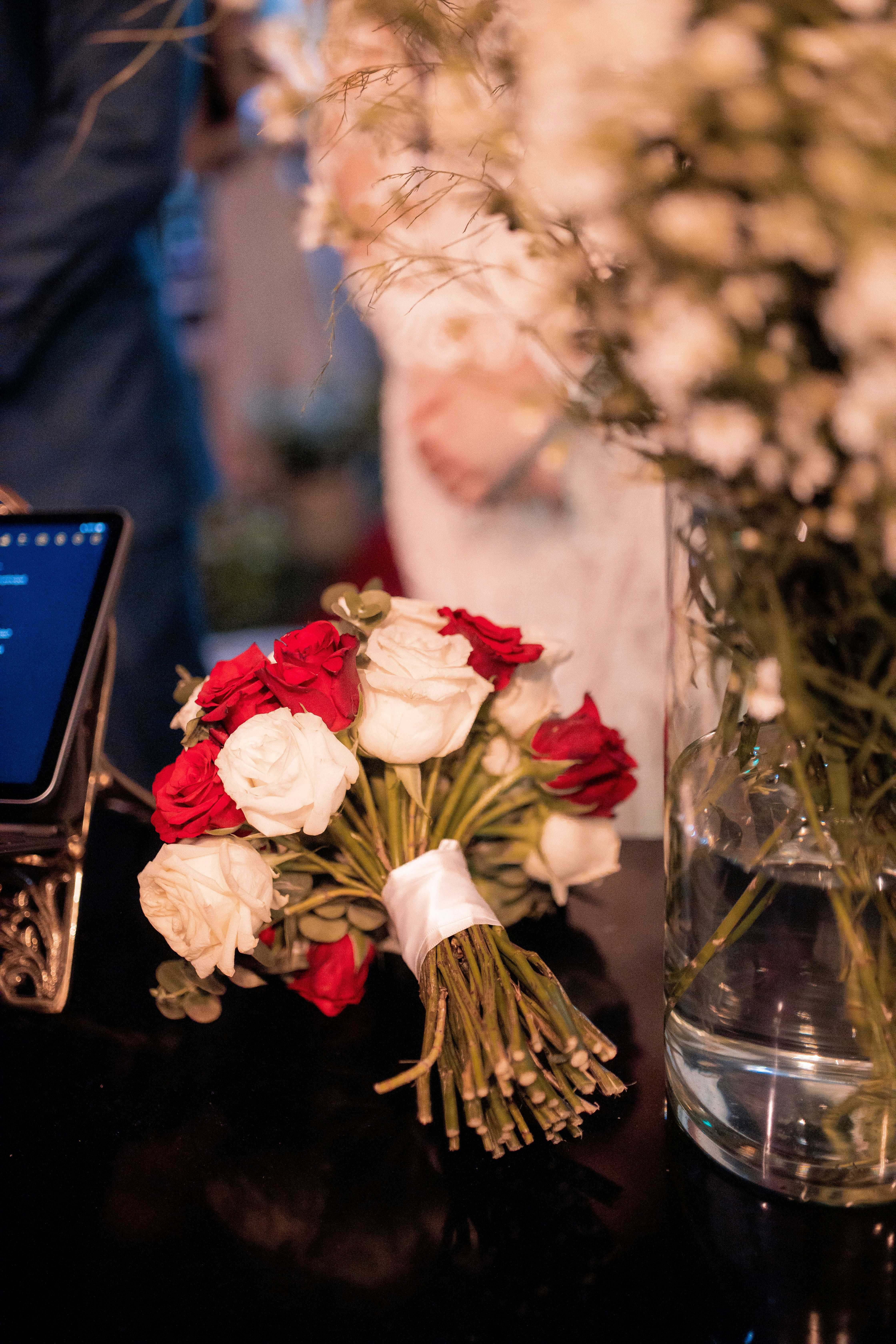 Bouquet of Red and Ivory — Quiet Moment at a Decorative Table
