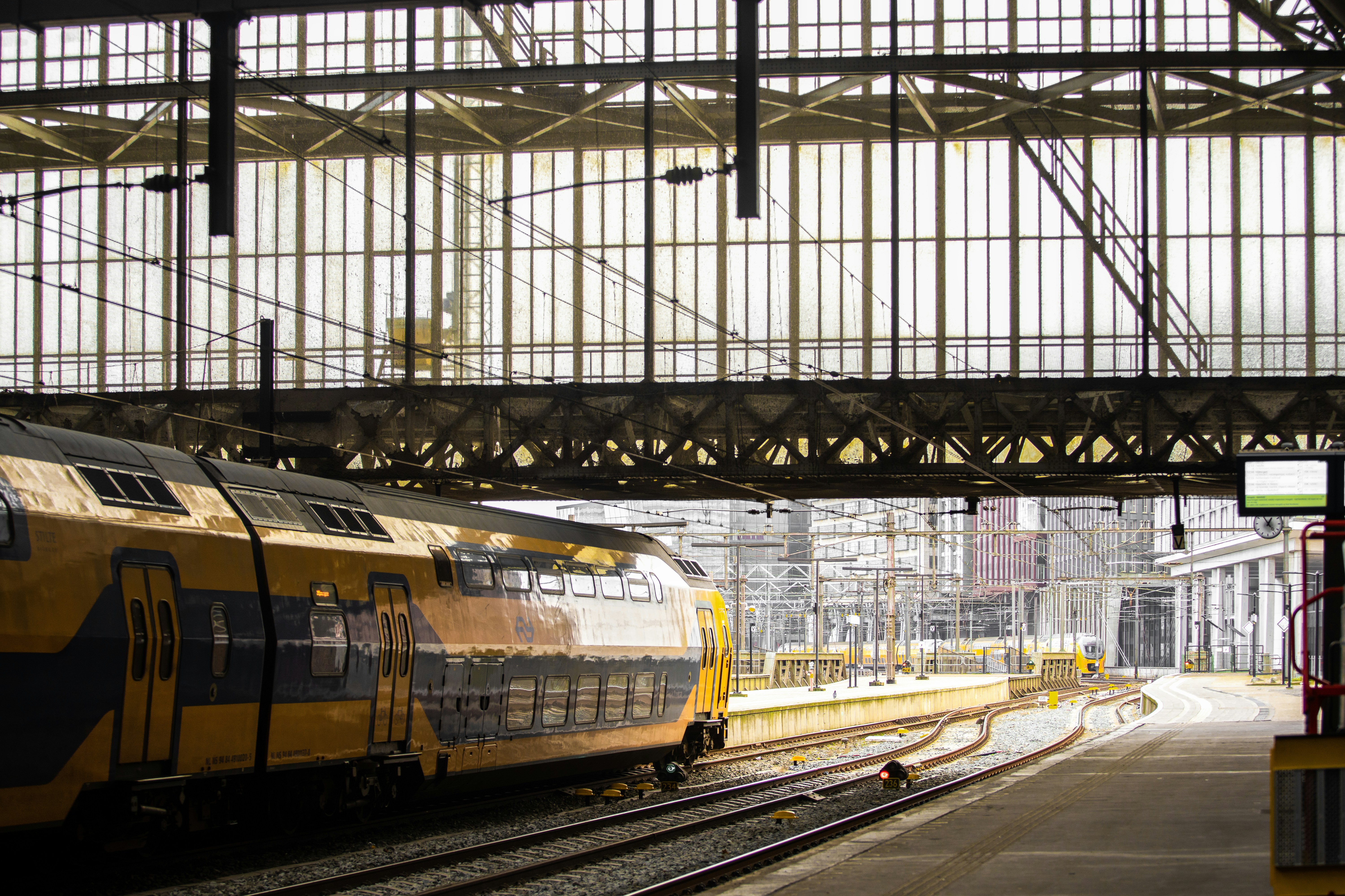 Amber Intercity at a Glass-Canopy Platform