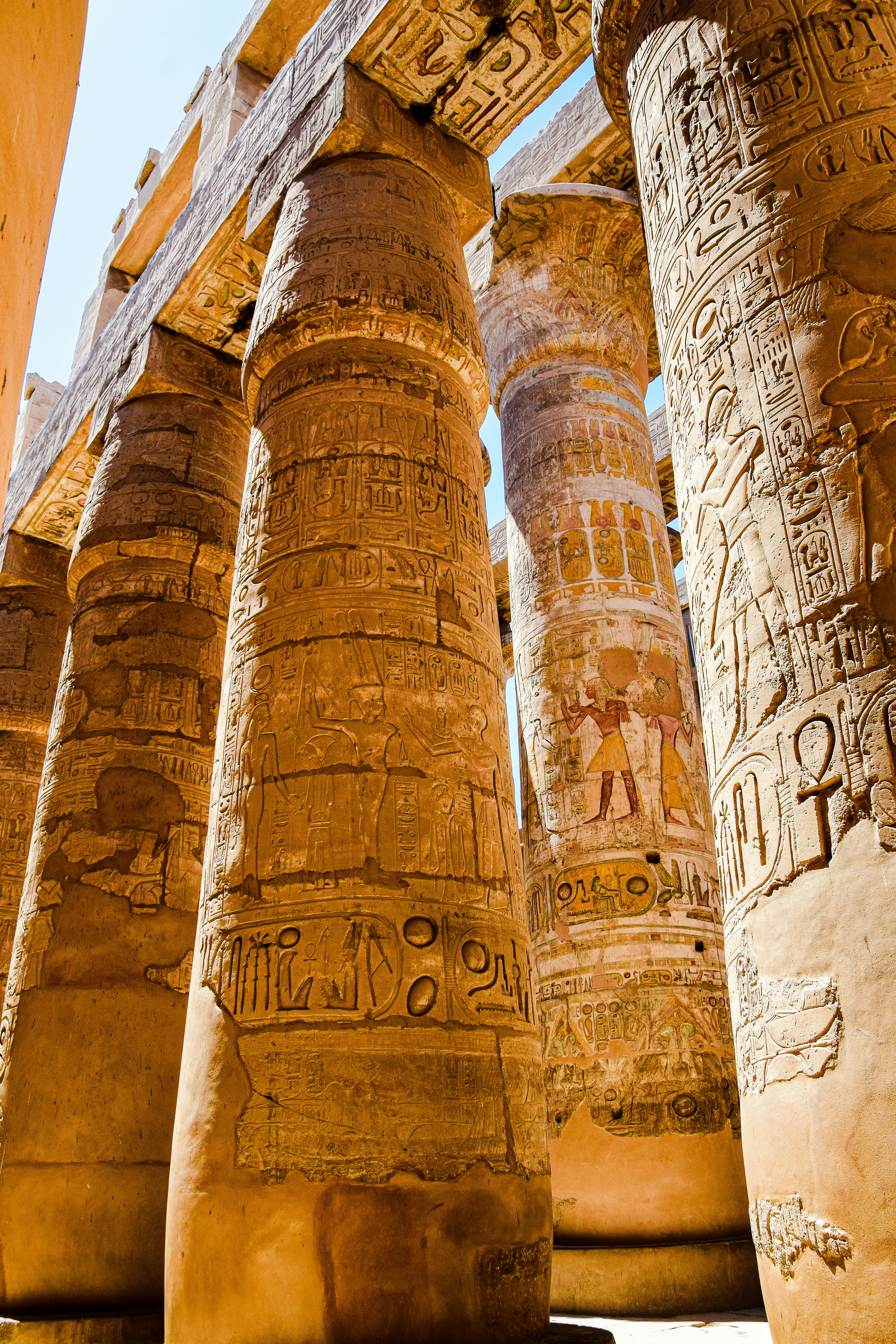 A number of large pillars with writing on them photo – Free Luxor Image ...