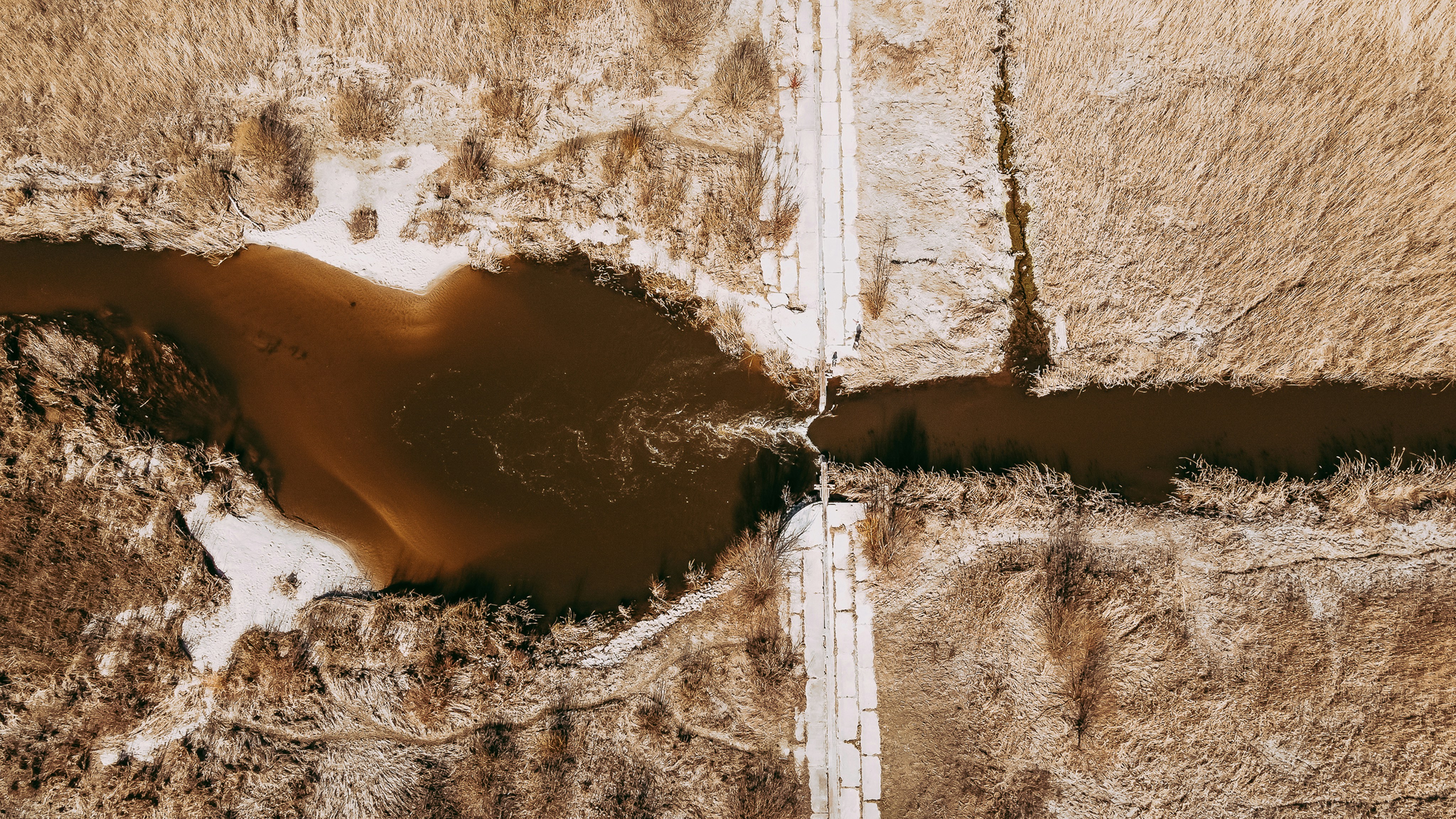 Crossed Dunes: A Quiet Rift Between Parched Fields