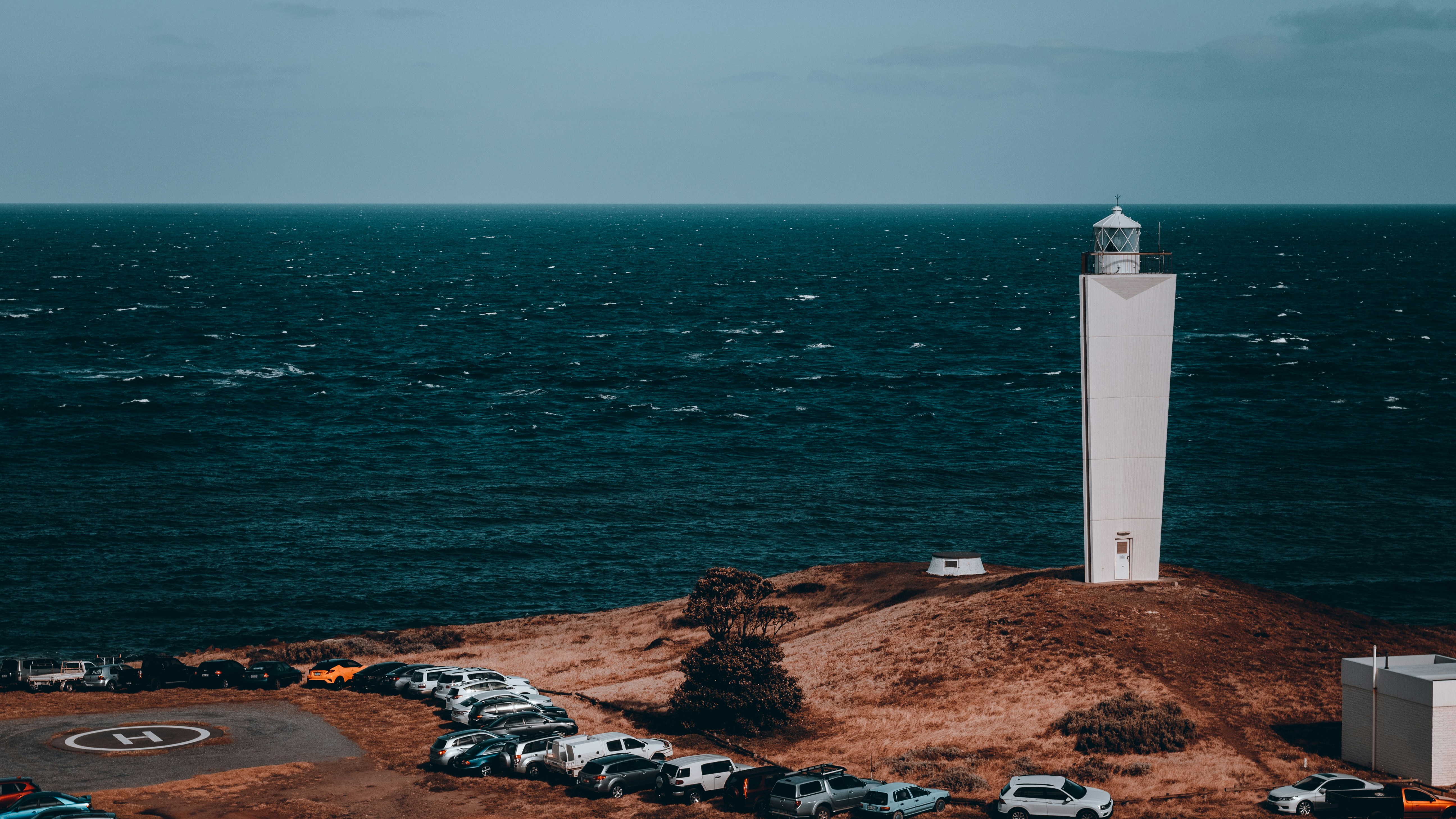 Lighthouse Sentinel Over a Windswept Coastal Ridge