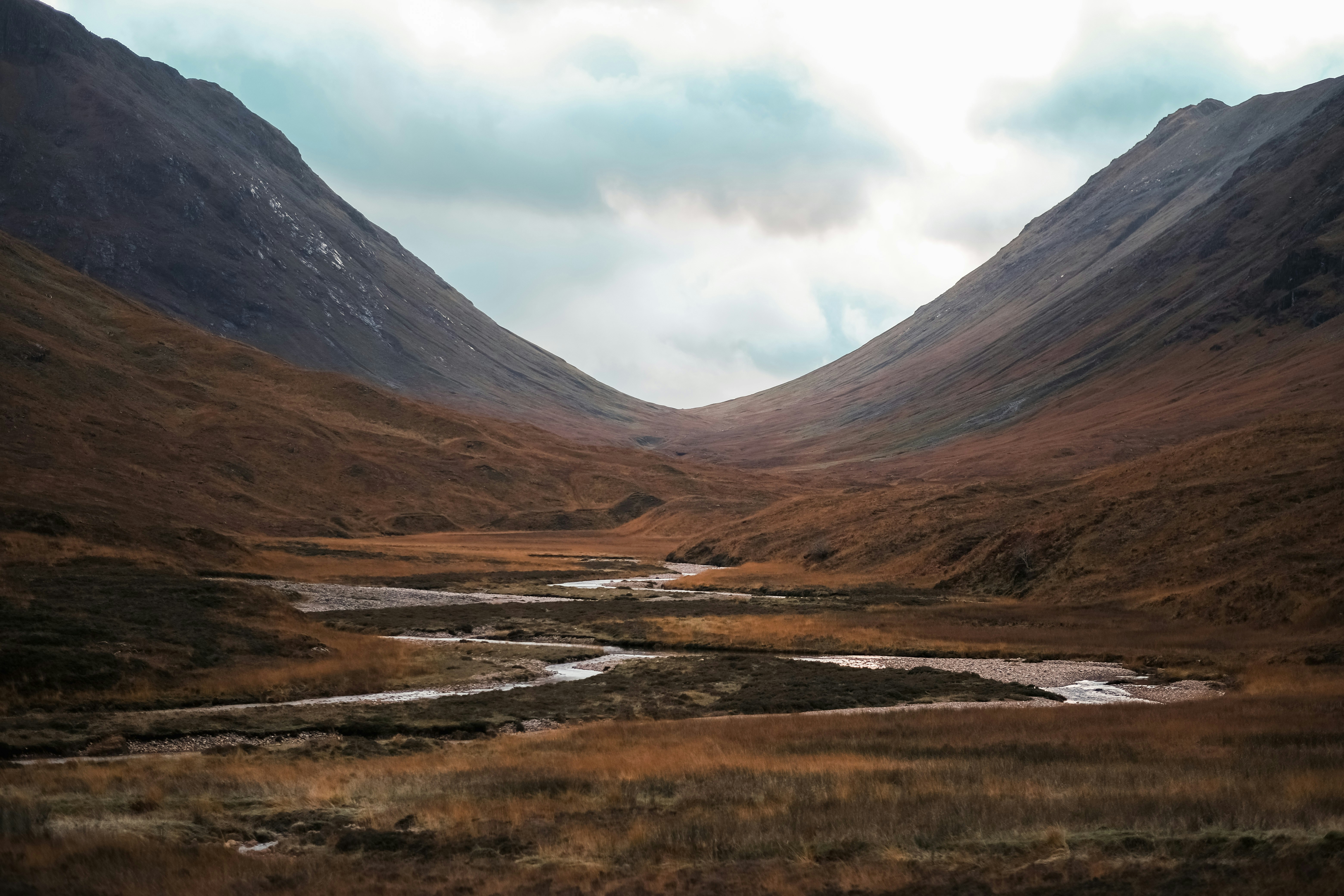 A valley with a stream running through it photo – Free Glencoe Image on ...