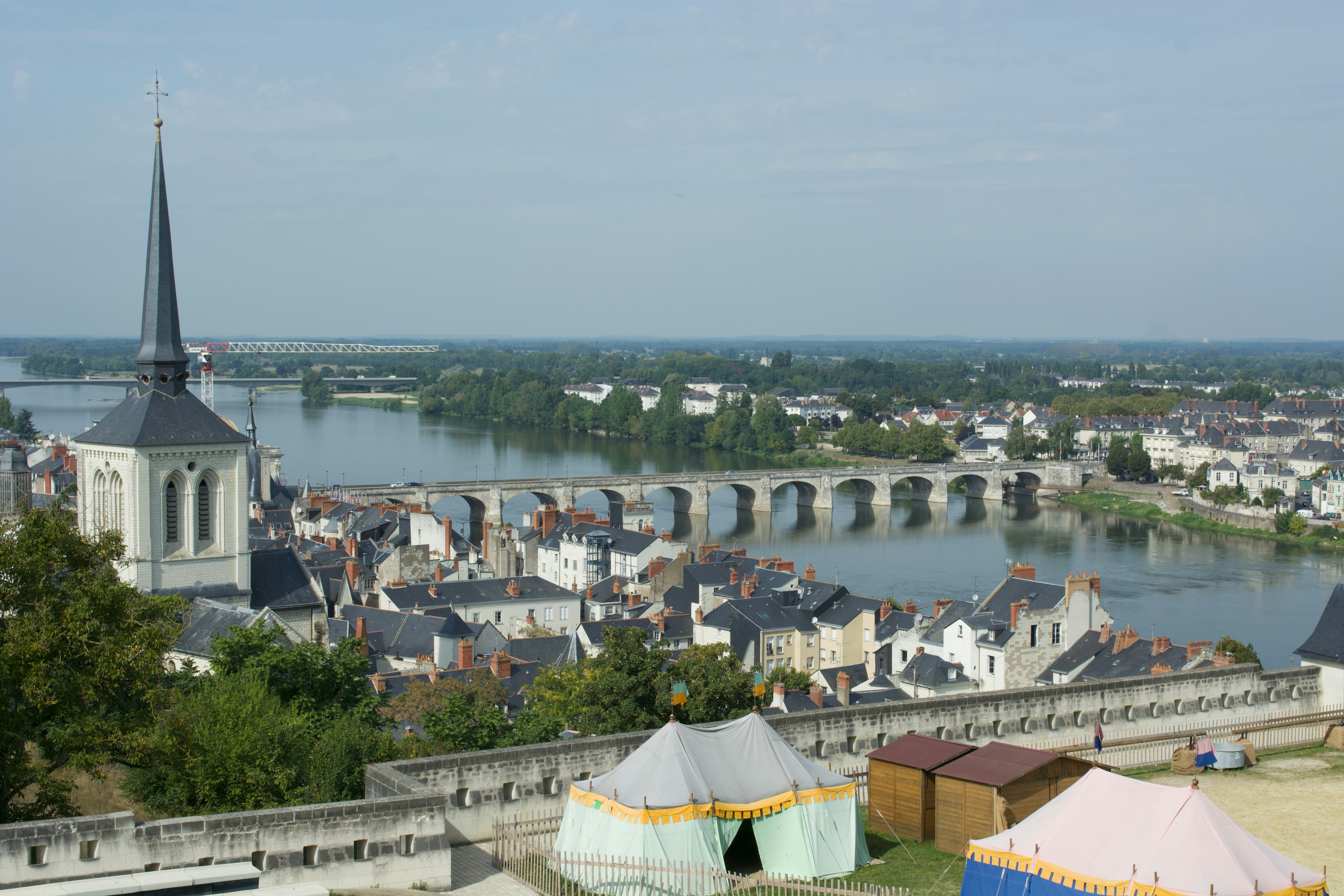 Spire, Arches, and Tents: A Hilltop Town by the River