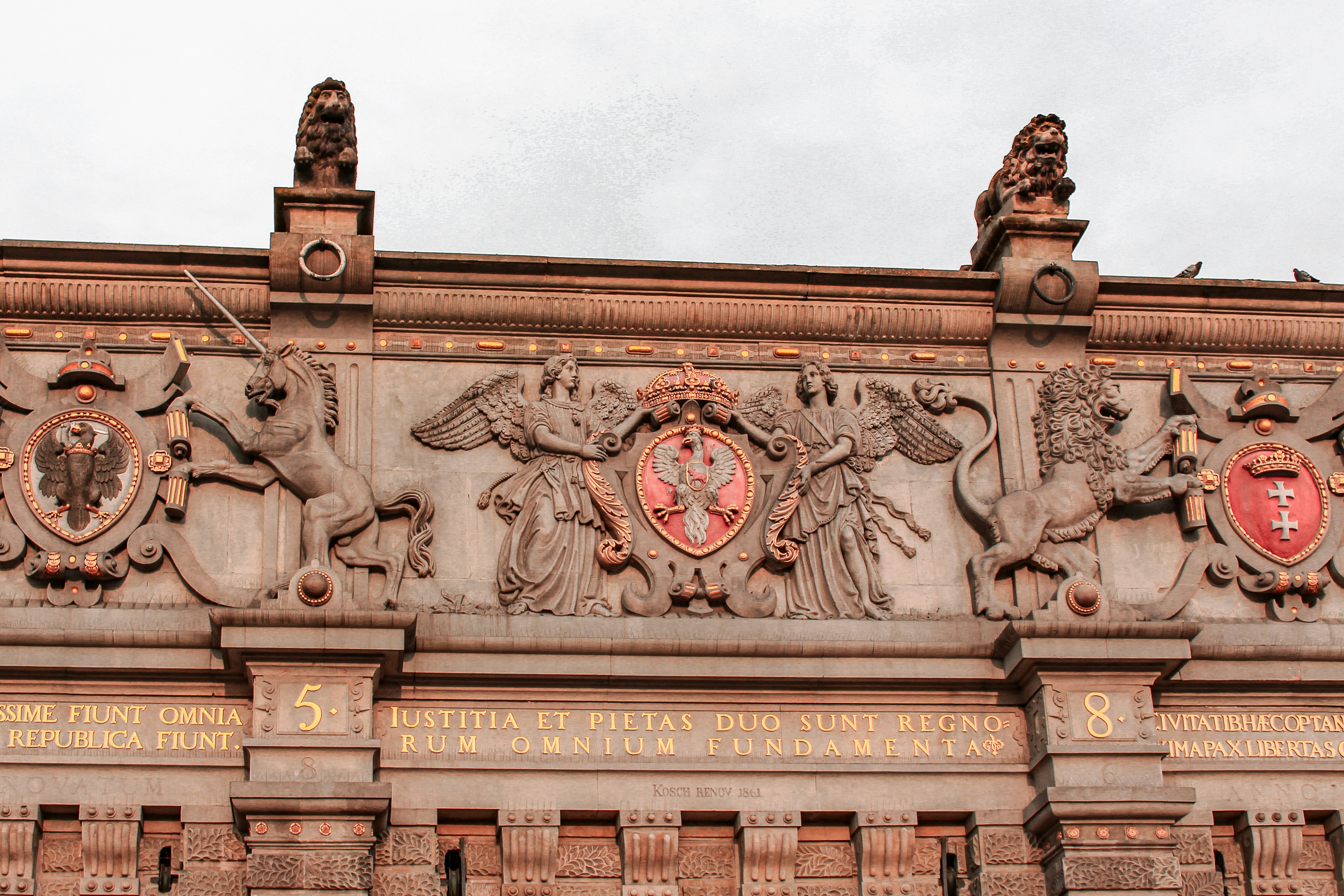 a close up of a building with a clock on it